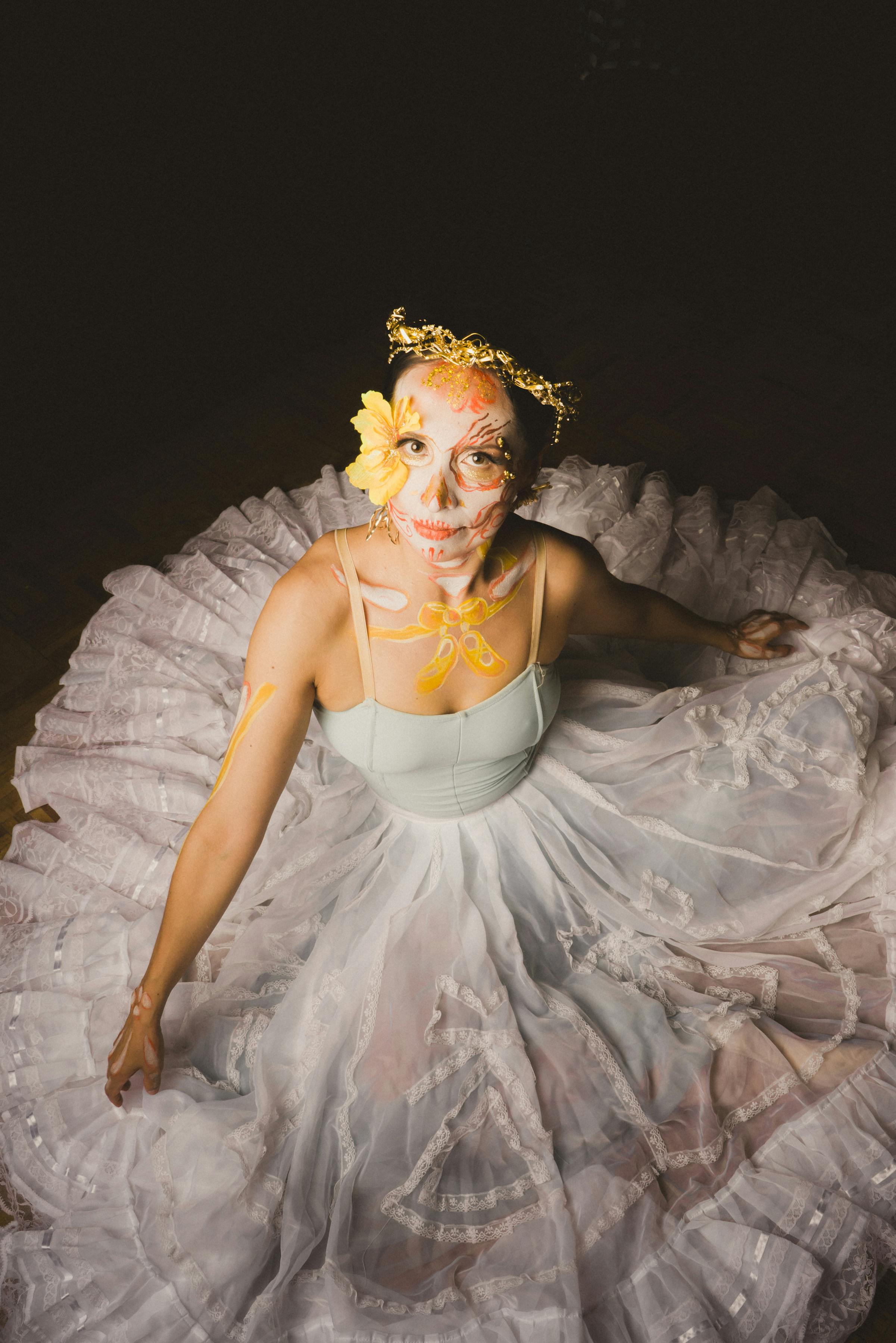 Elegant Catrina Dancer in Day of the Dead Makeup · Free Stock Photo