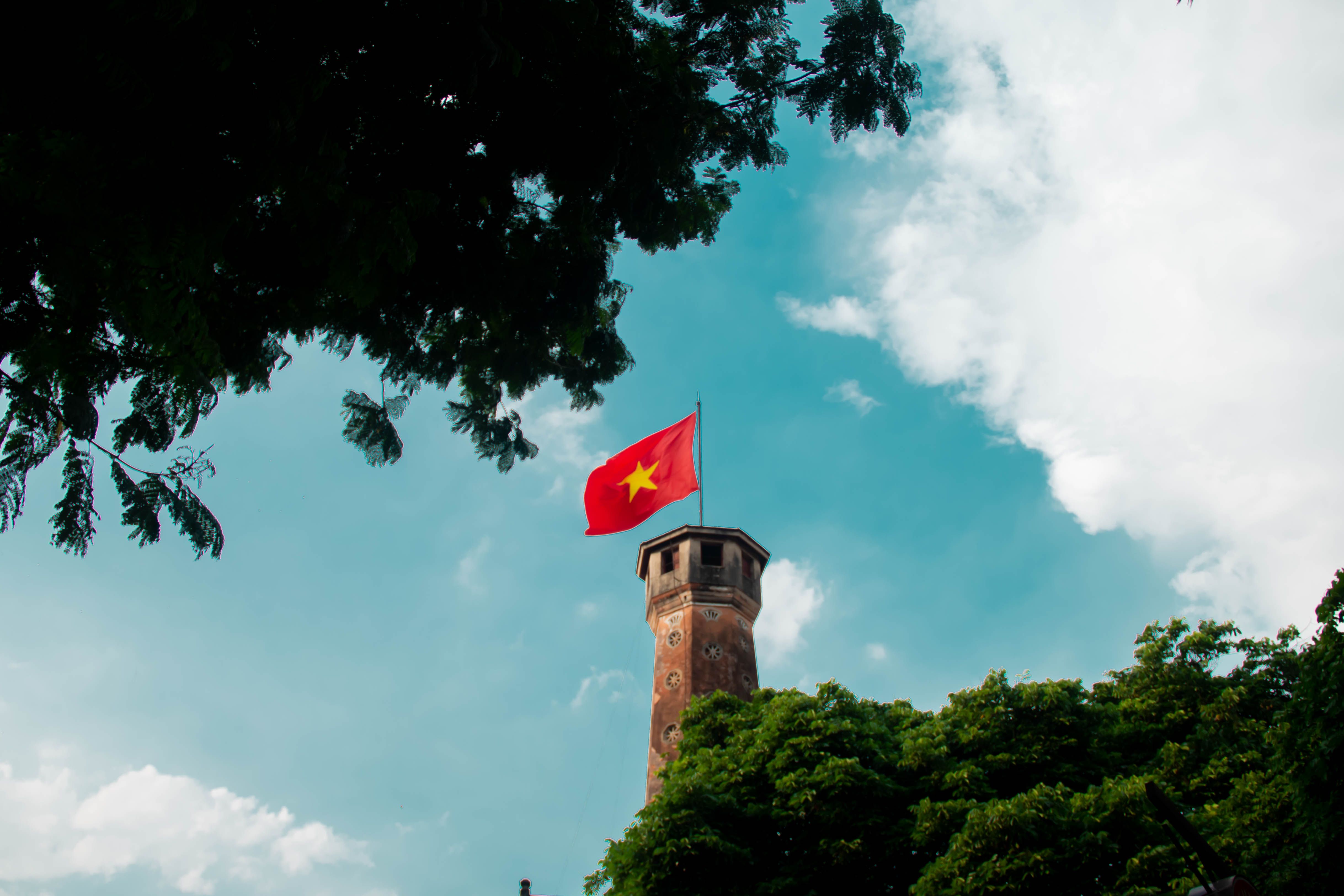 Hanoi Flag Tower with Vietnamese Flag · Free Stock Photo