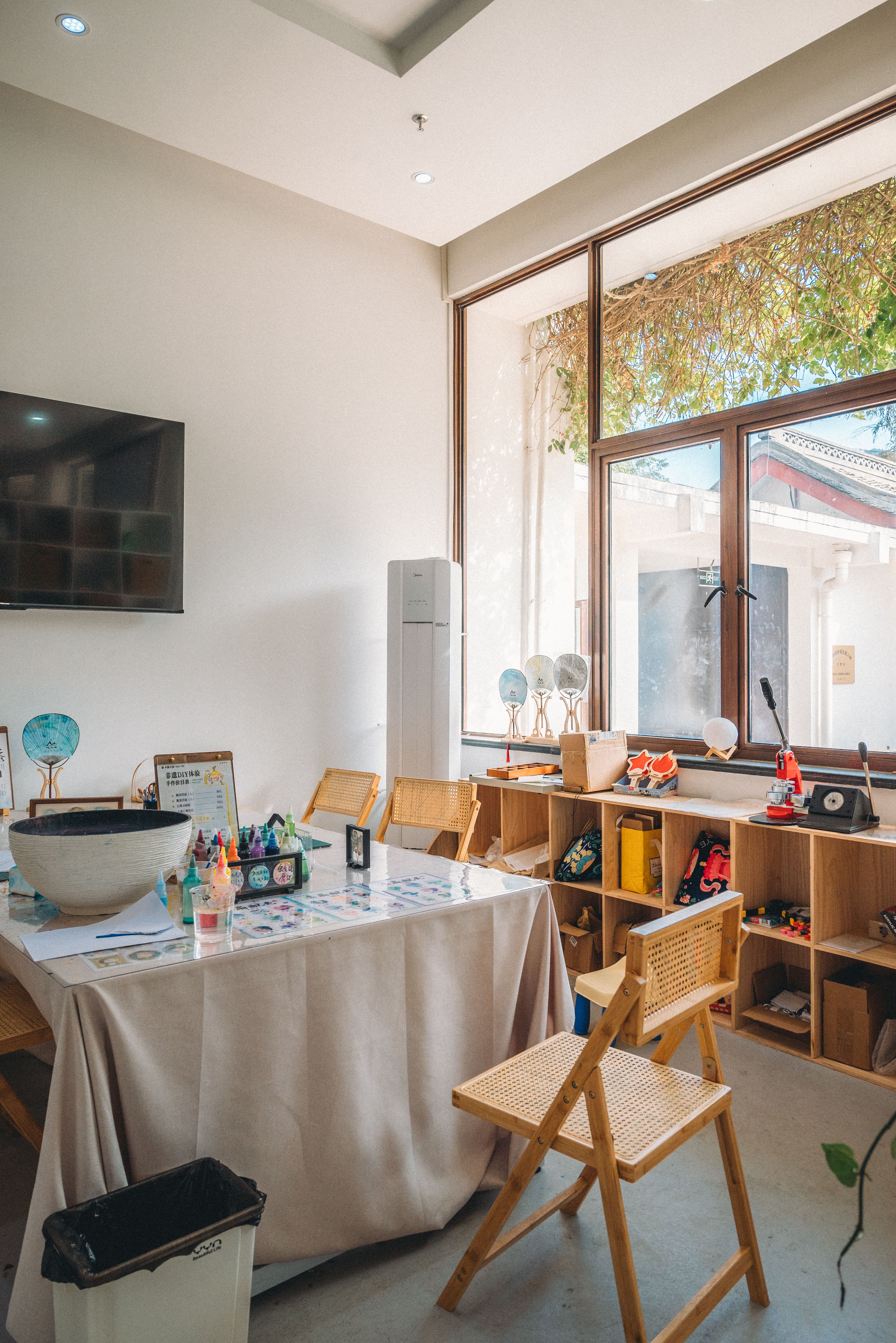 Bright Art Studio Interior with Sunlit Workstation · Free Stock Photo