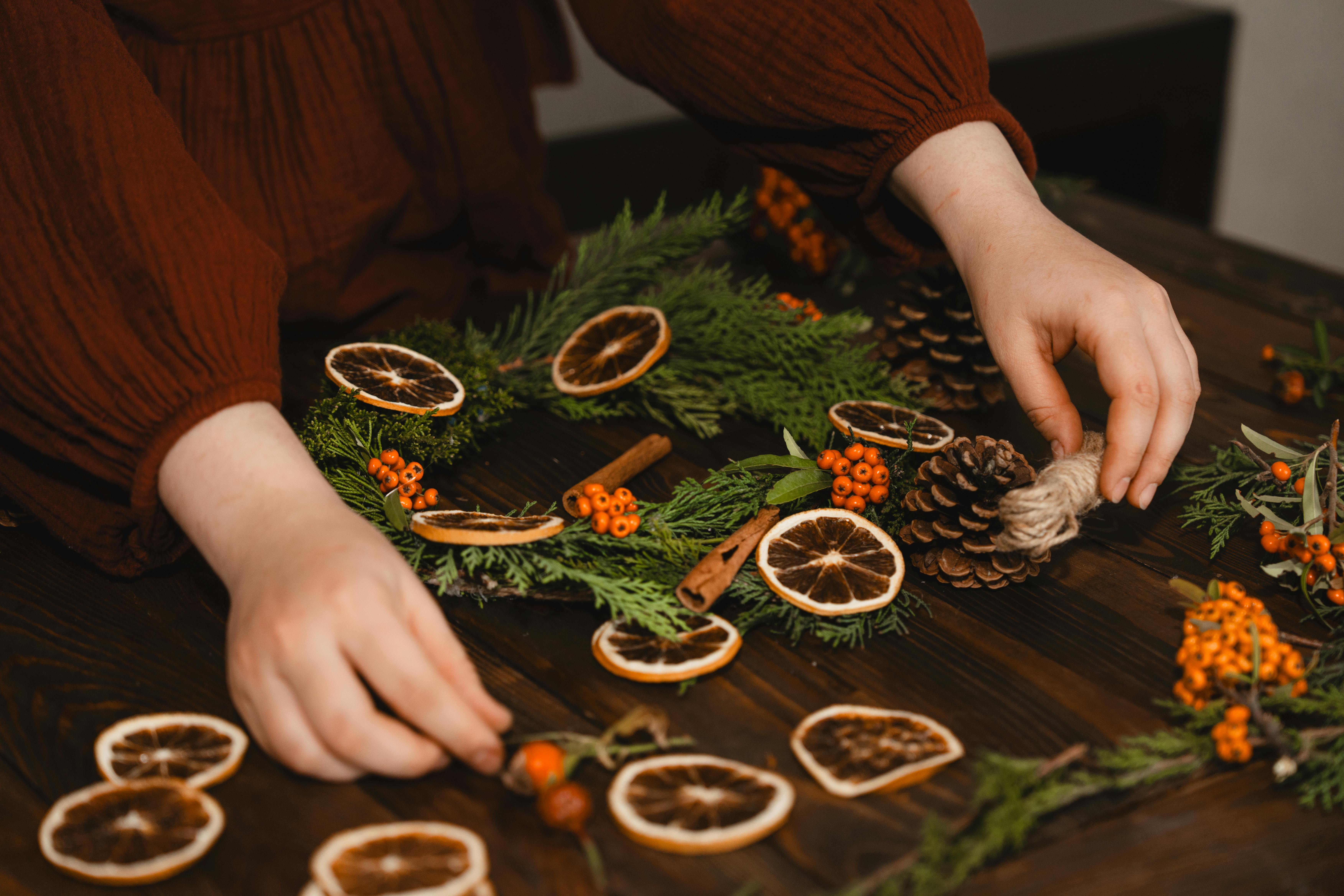 Crafting a Natural Festive Holiday Wreath · Free Stock Photo