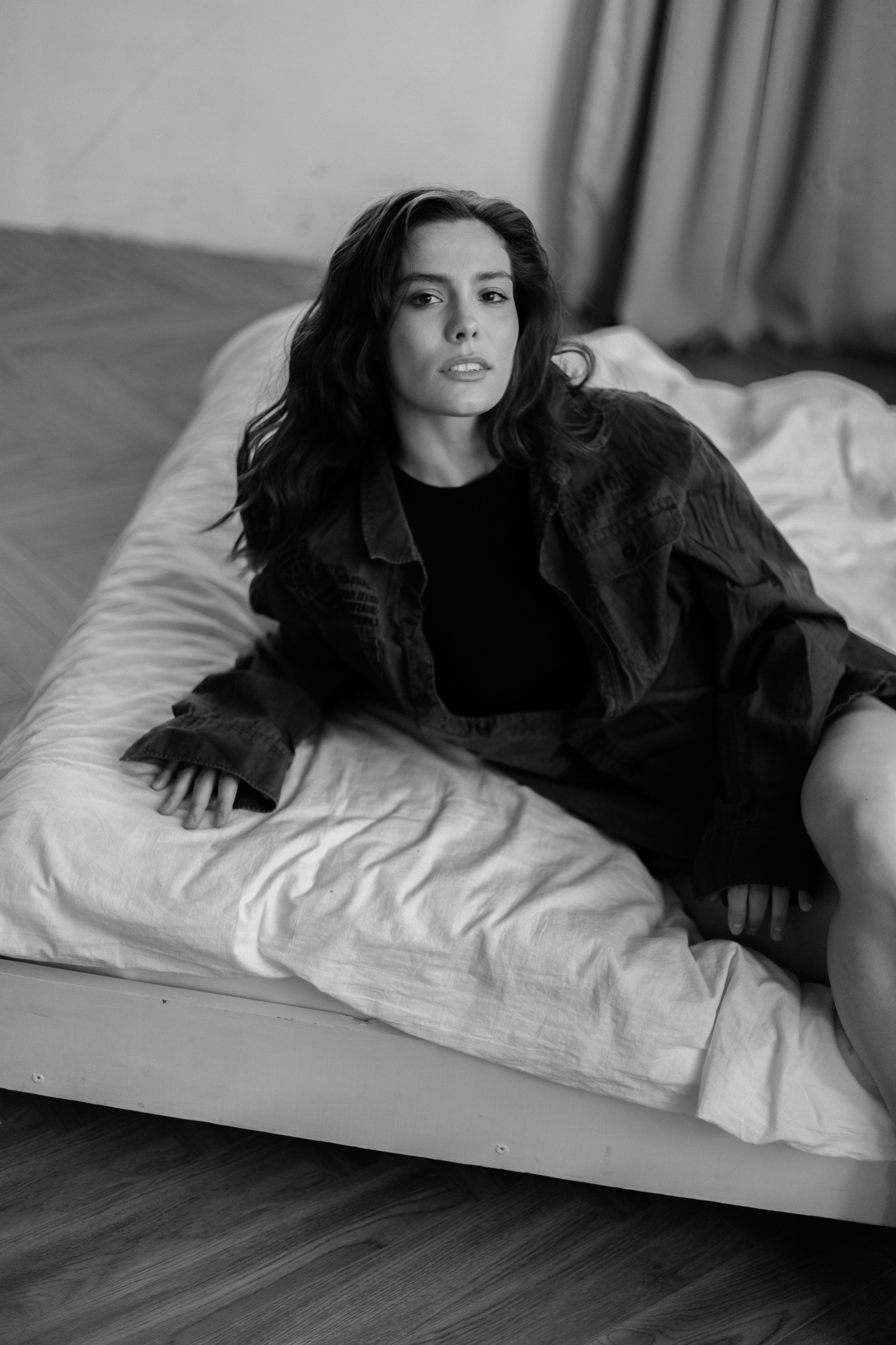 Casual Portrait of Woman Reclining on Bed · Free Stock Photo