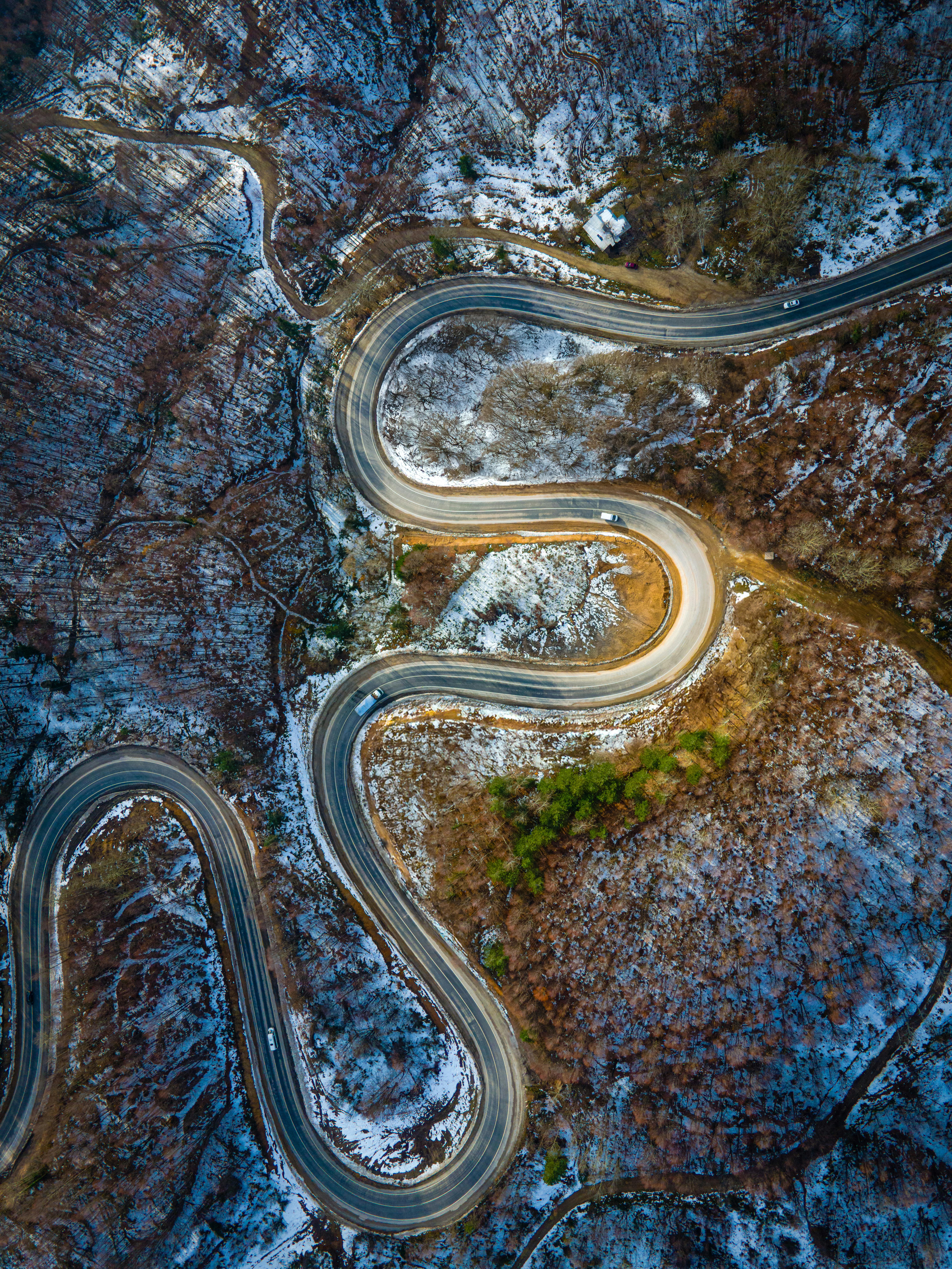 Scenic Aerial View of Winding Mountain Road · Free Stock Photo