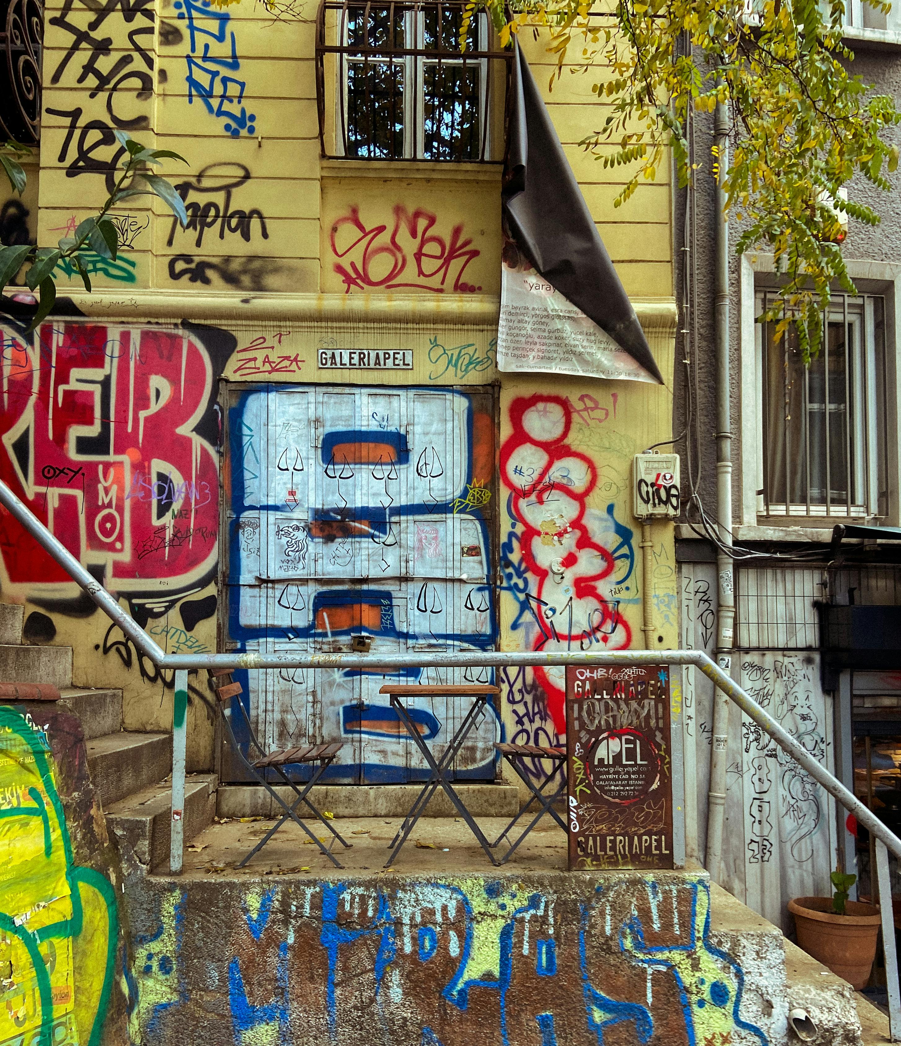 Vibrant Graffiti Adorning Urban Staircase · Free Stock Photo