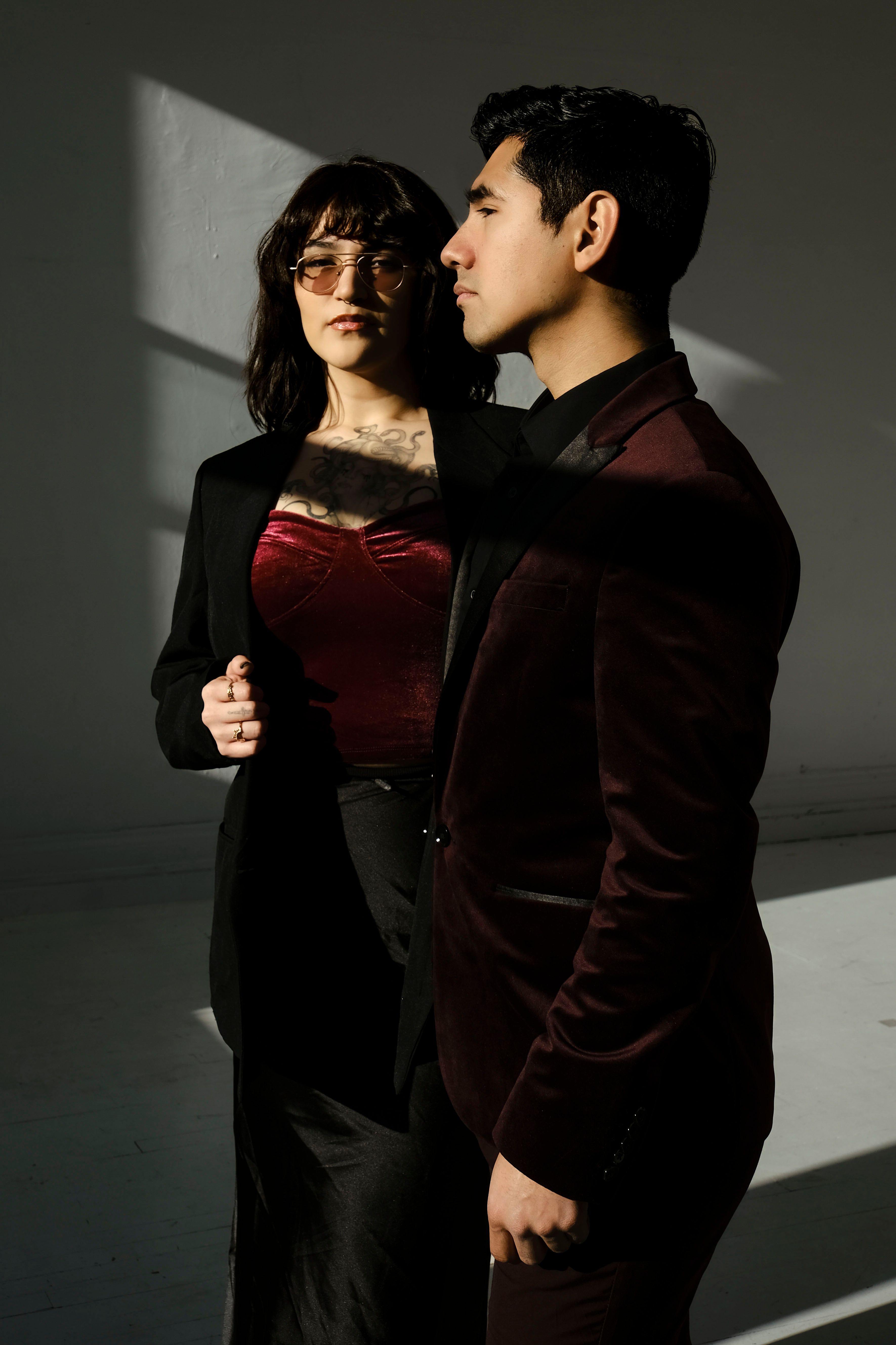 Stylish Couple in Dim Lighting Portrait · Free Stock Photo