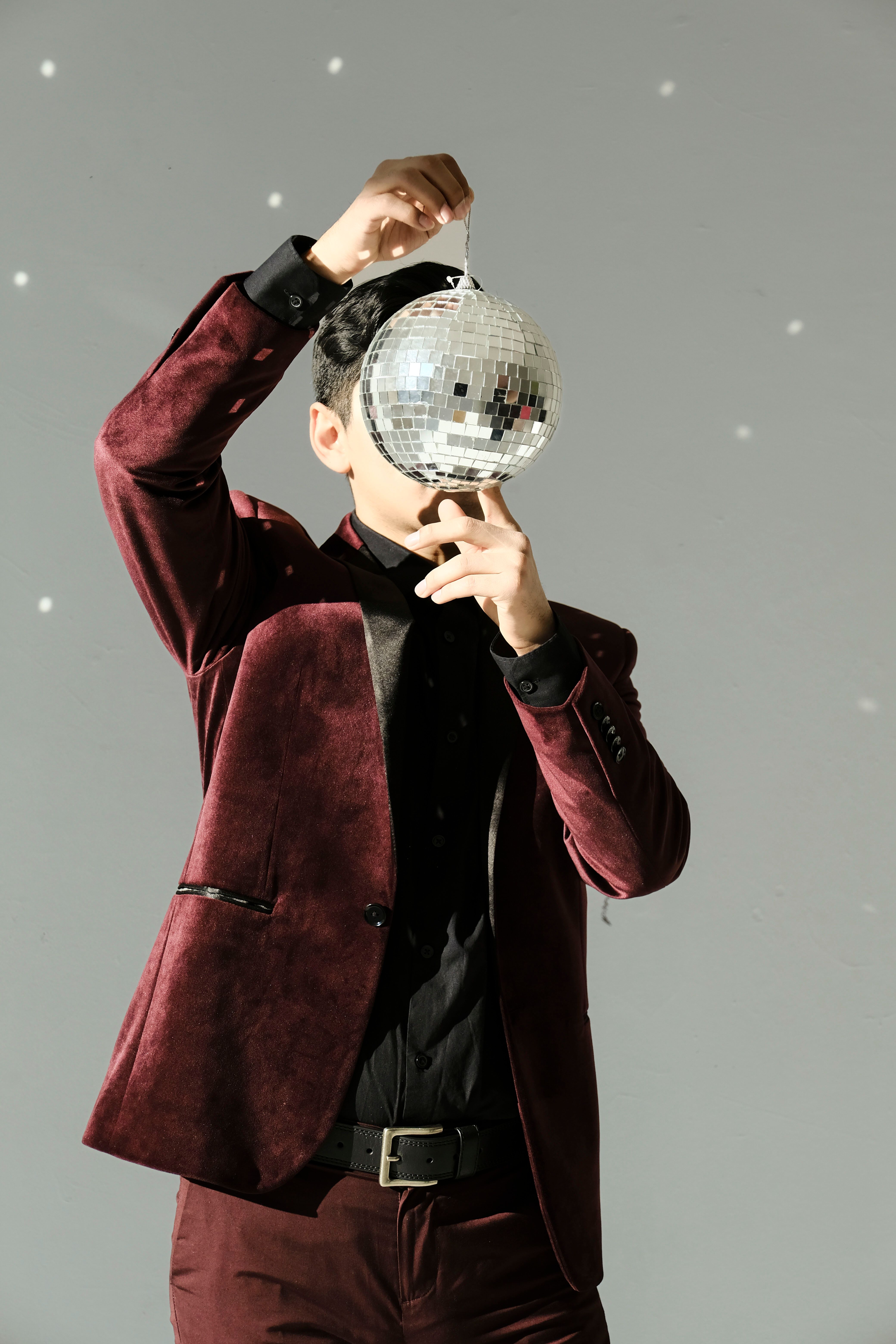 Modern Elegance with Disco Ball and Velvet Suit · Free Stock Photo