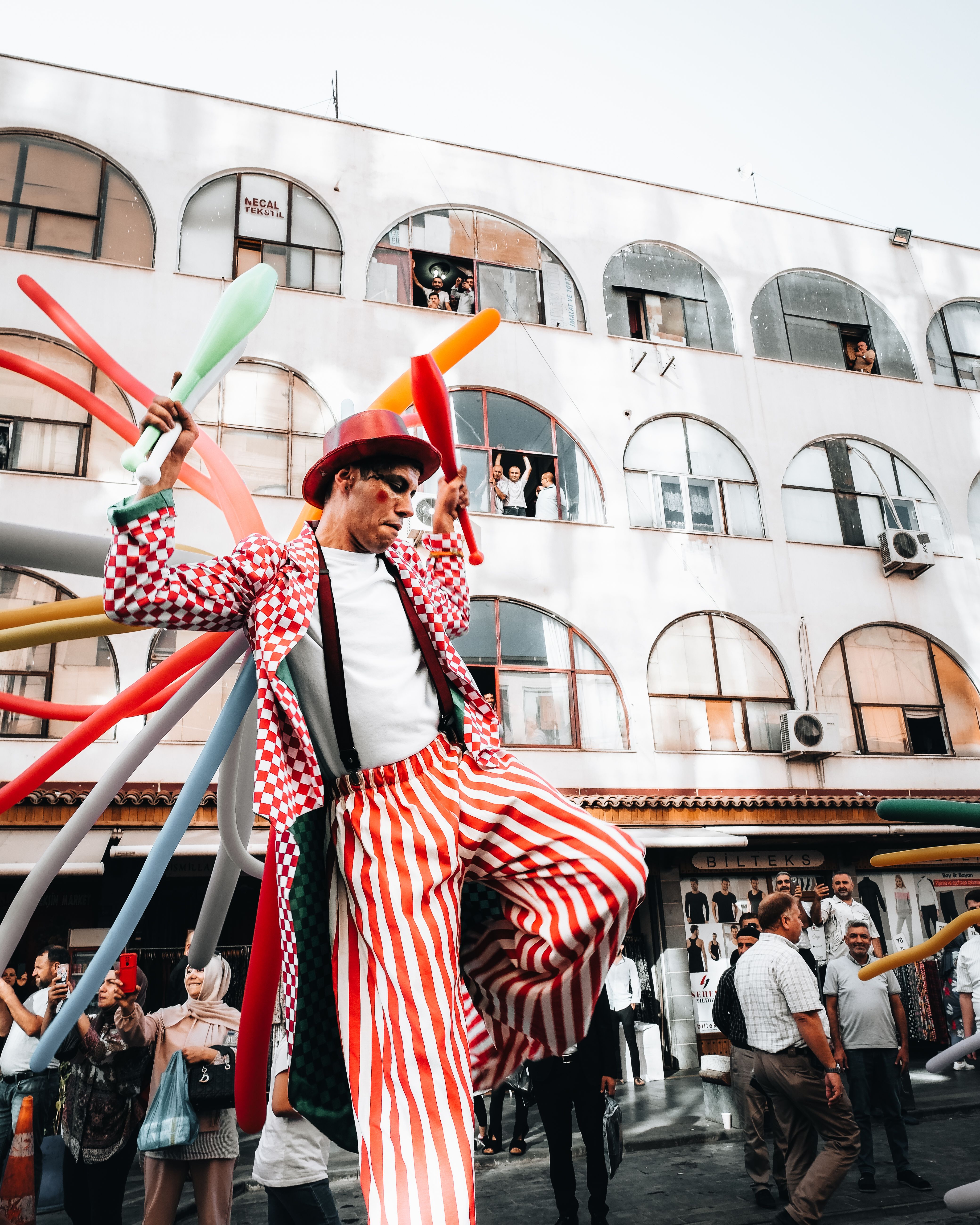 Street Performer Entertains Busy Crowd · Free Stock Photo