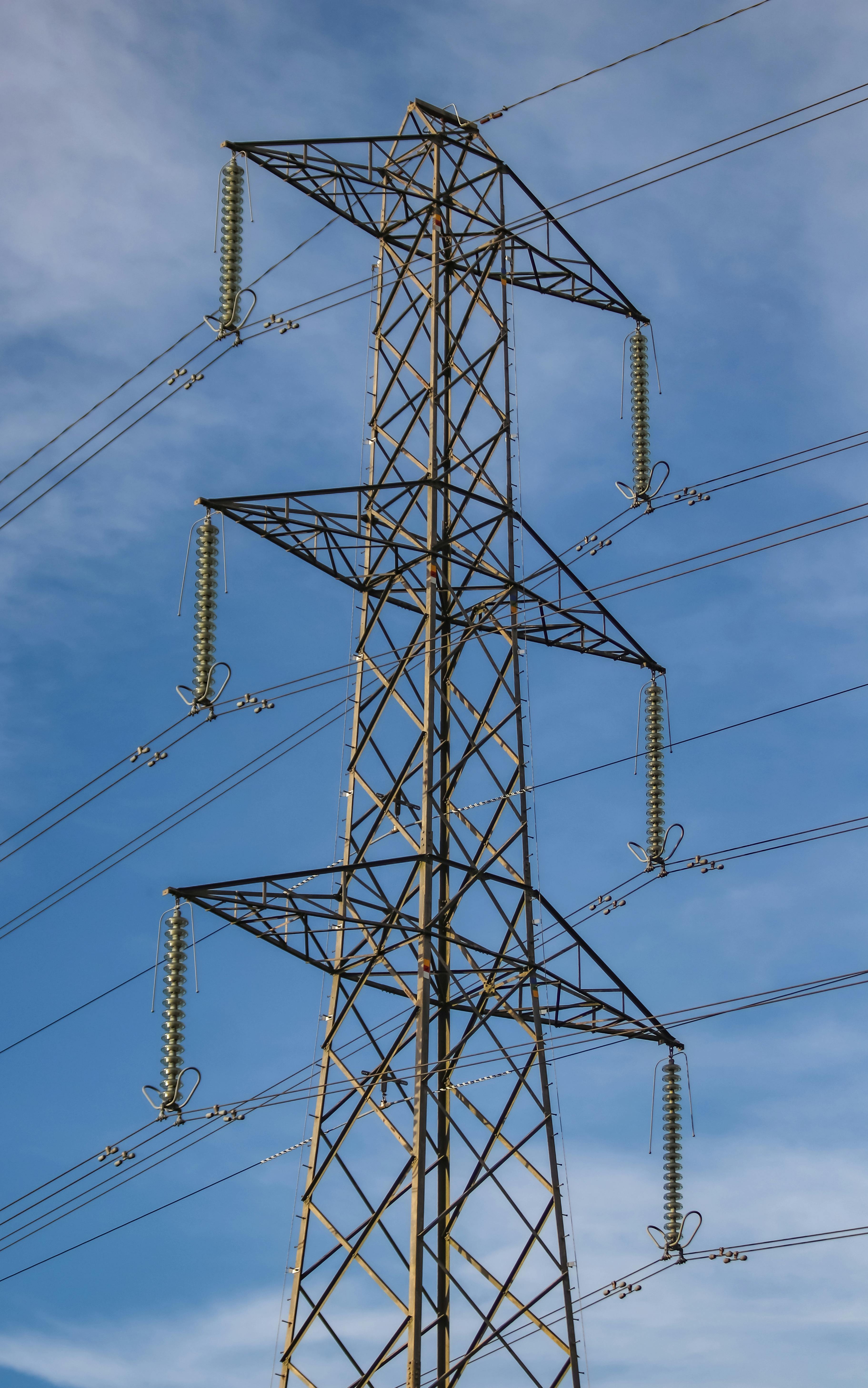 Low Angle Photograph of Black Metal Tower Satellite during Daytime ...