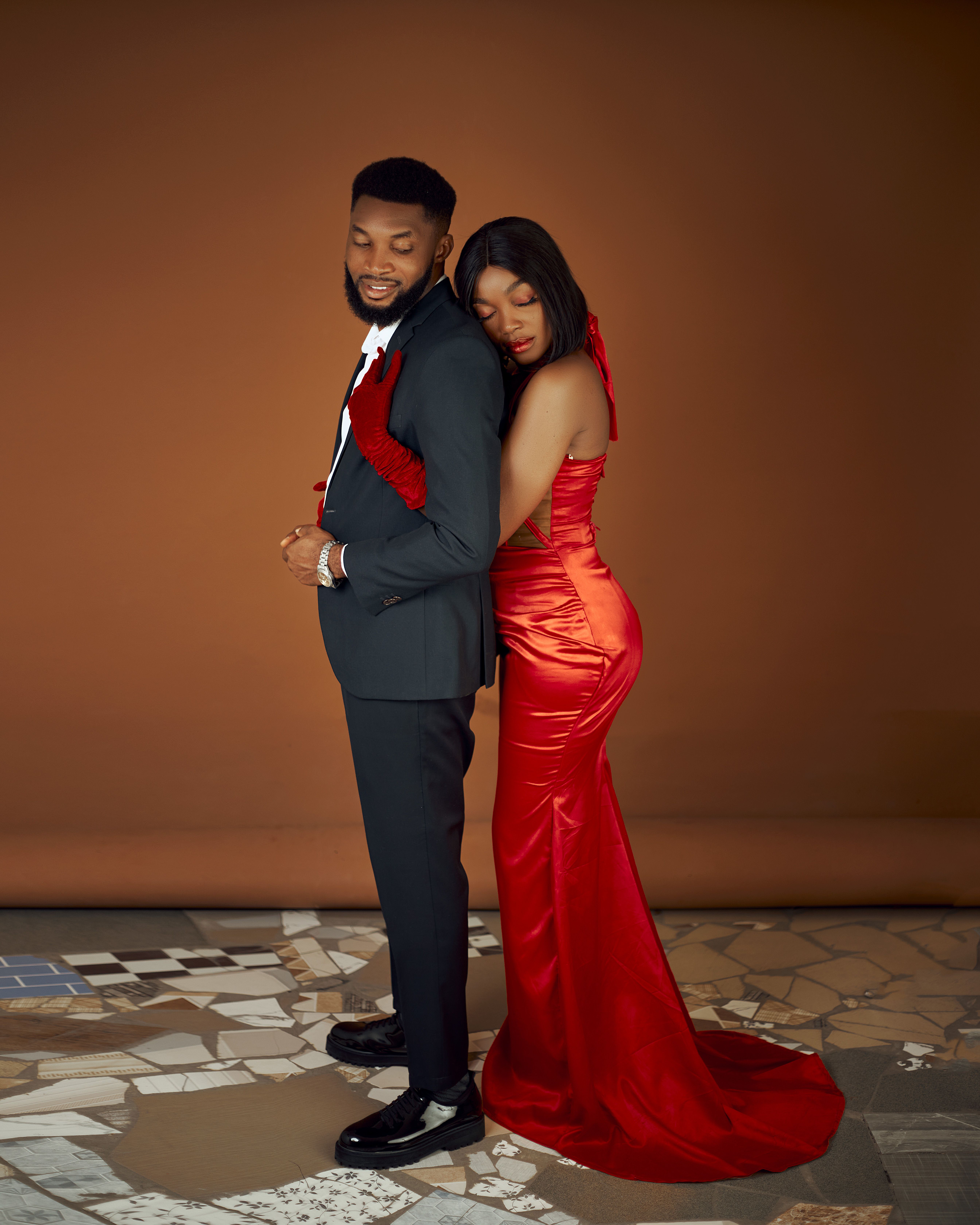 Elegant Couple in Formal Attire Embracing · Free Stock Photo