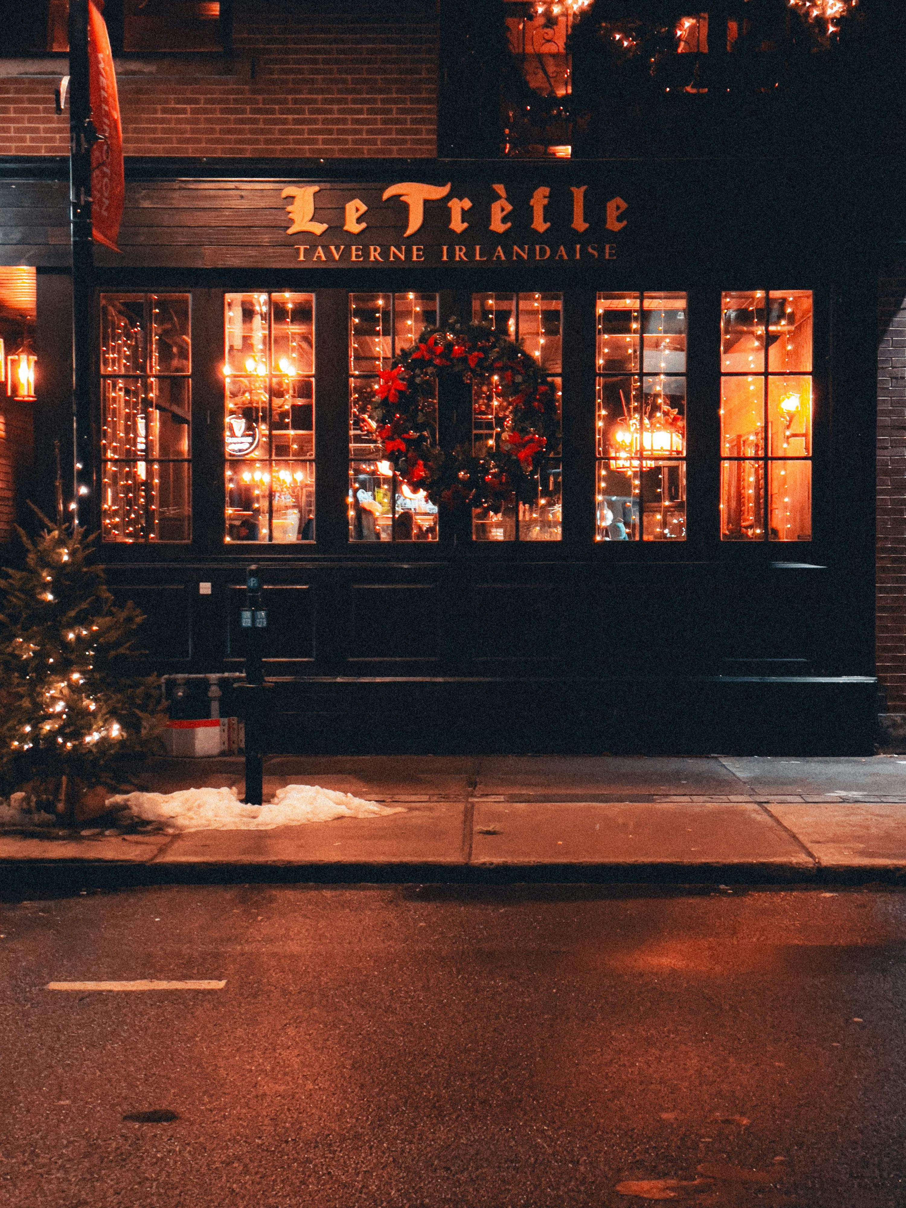 Cozy Irish Tavern Exterior with Festive Decor · Free Stock Photo