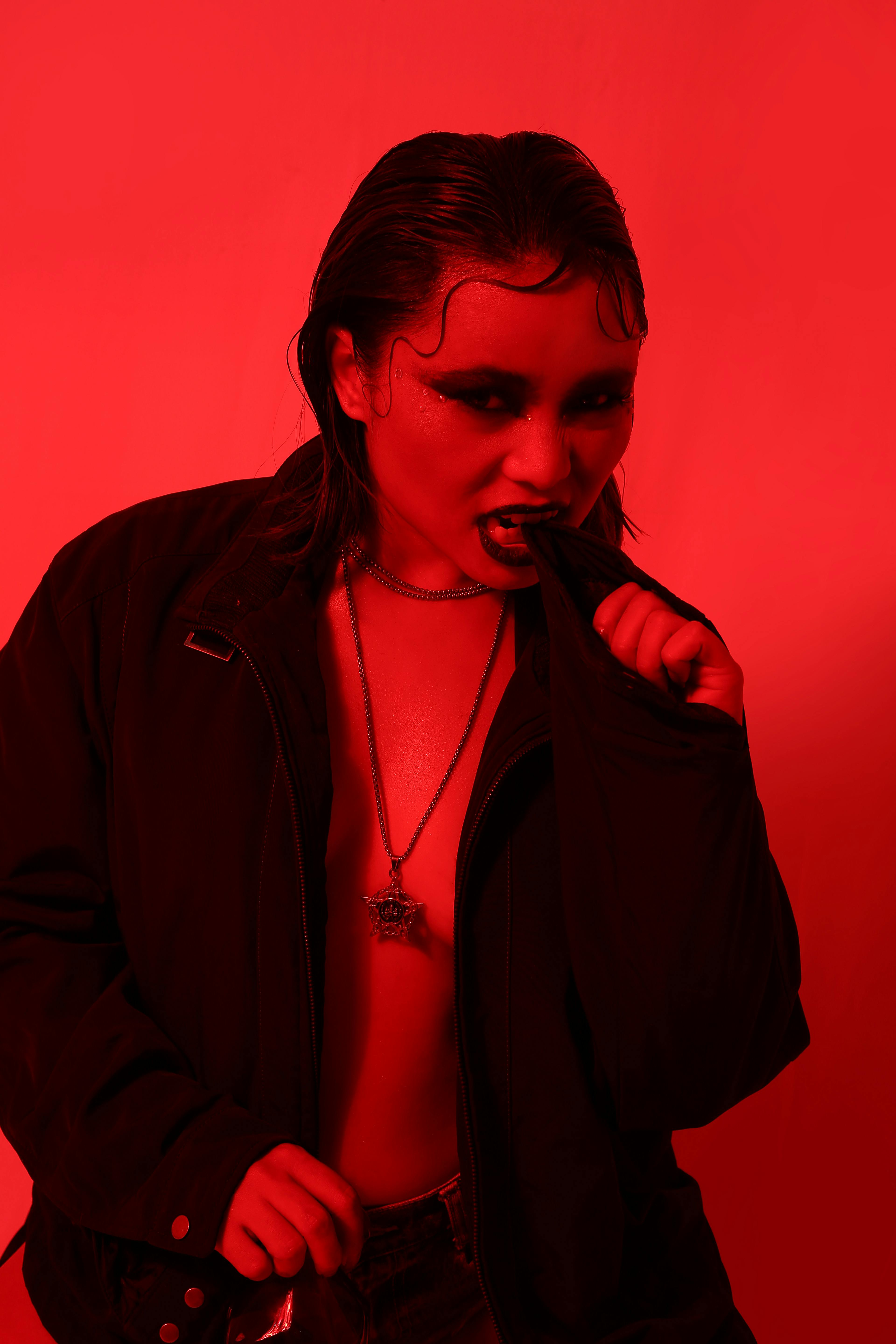Edgy Portrait in Dramatic Red Lighting · Free Stock Photo