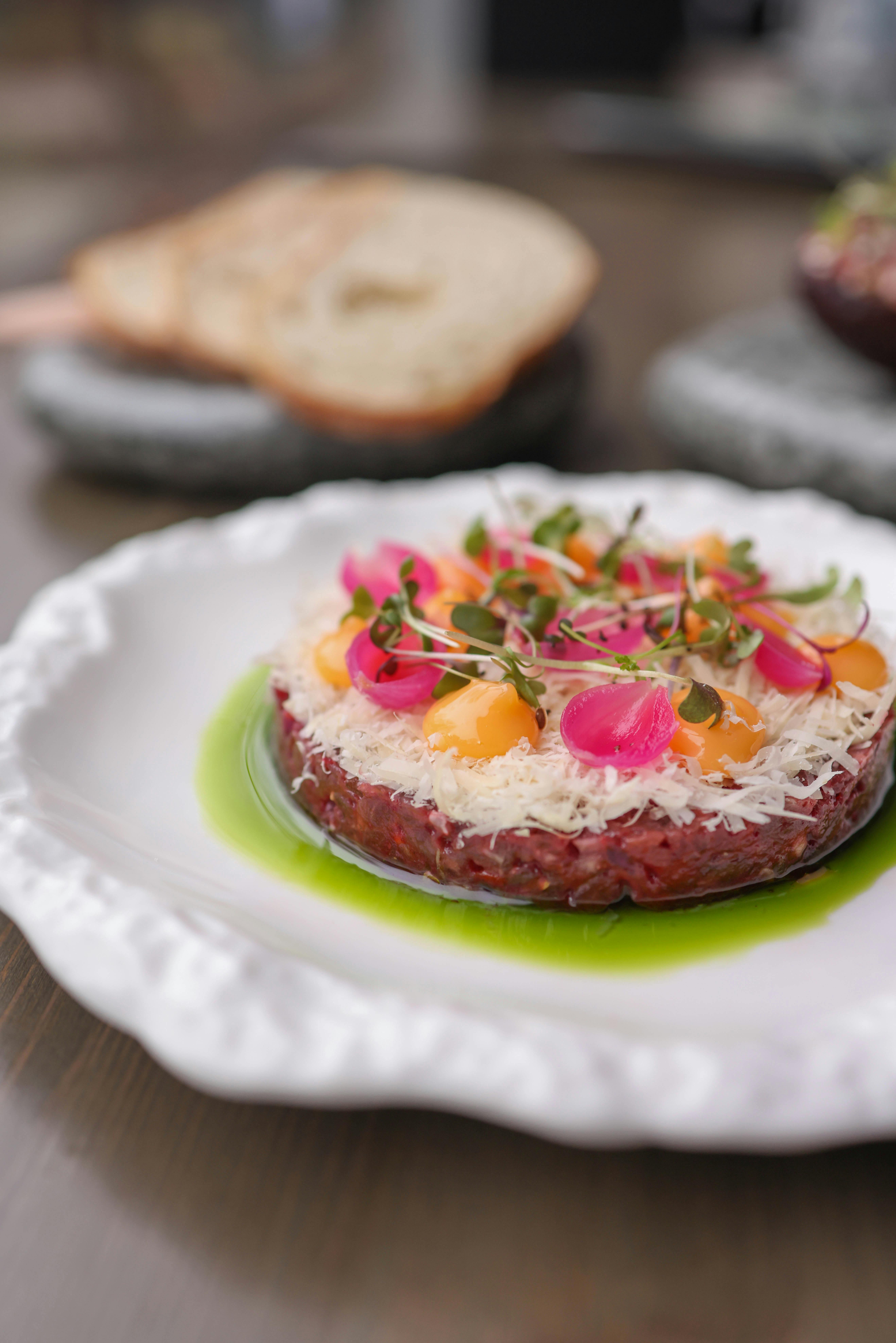 Gourmet Beef Tartare with Microgreens and Vegetables · Free Stock Photo