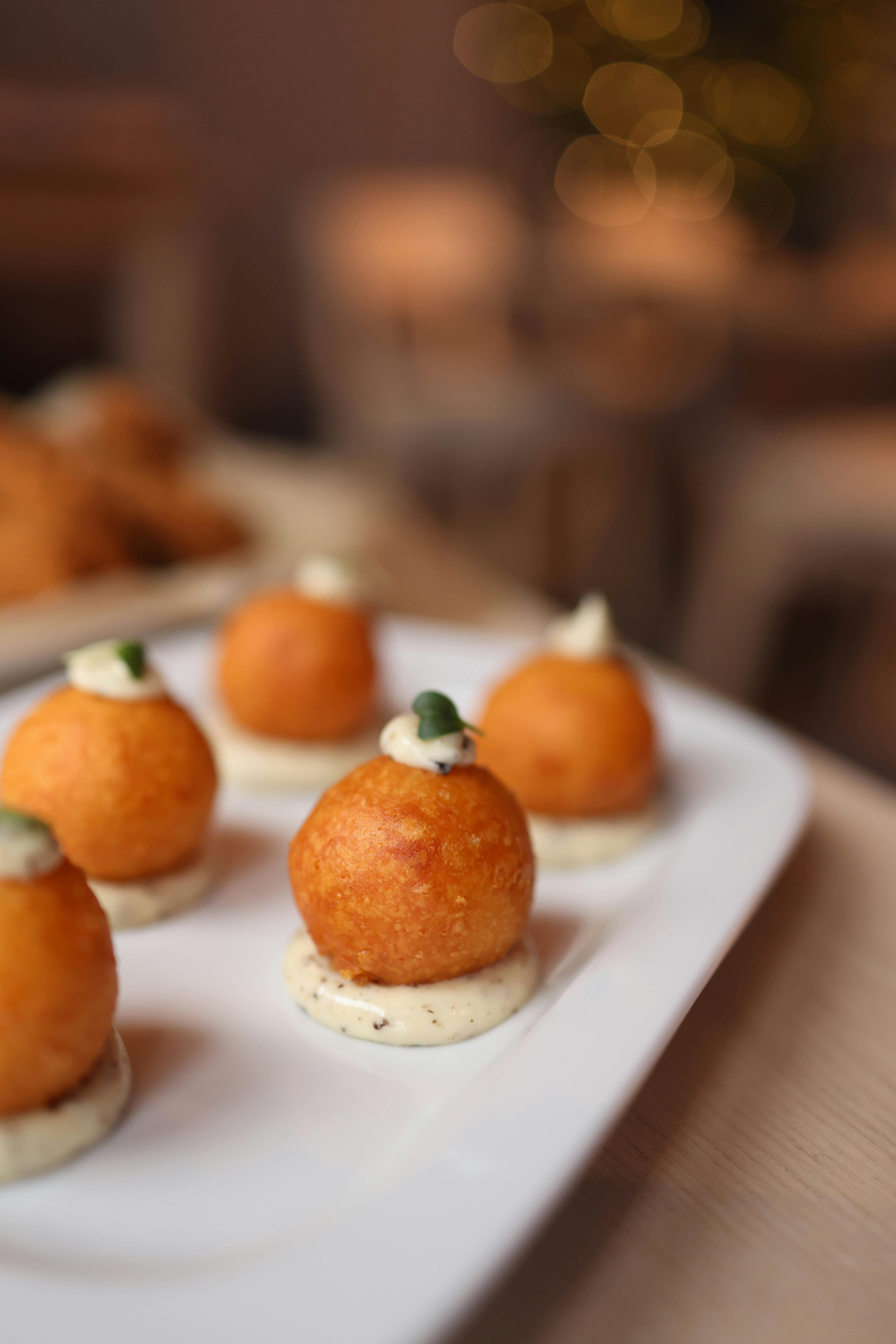 Delicately Plated Gourmet Appetizers on White Dish · Free Stock Photo