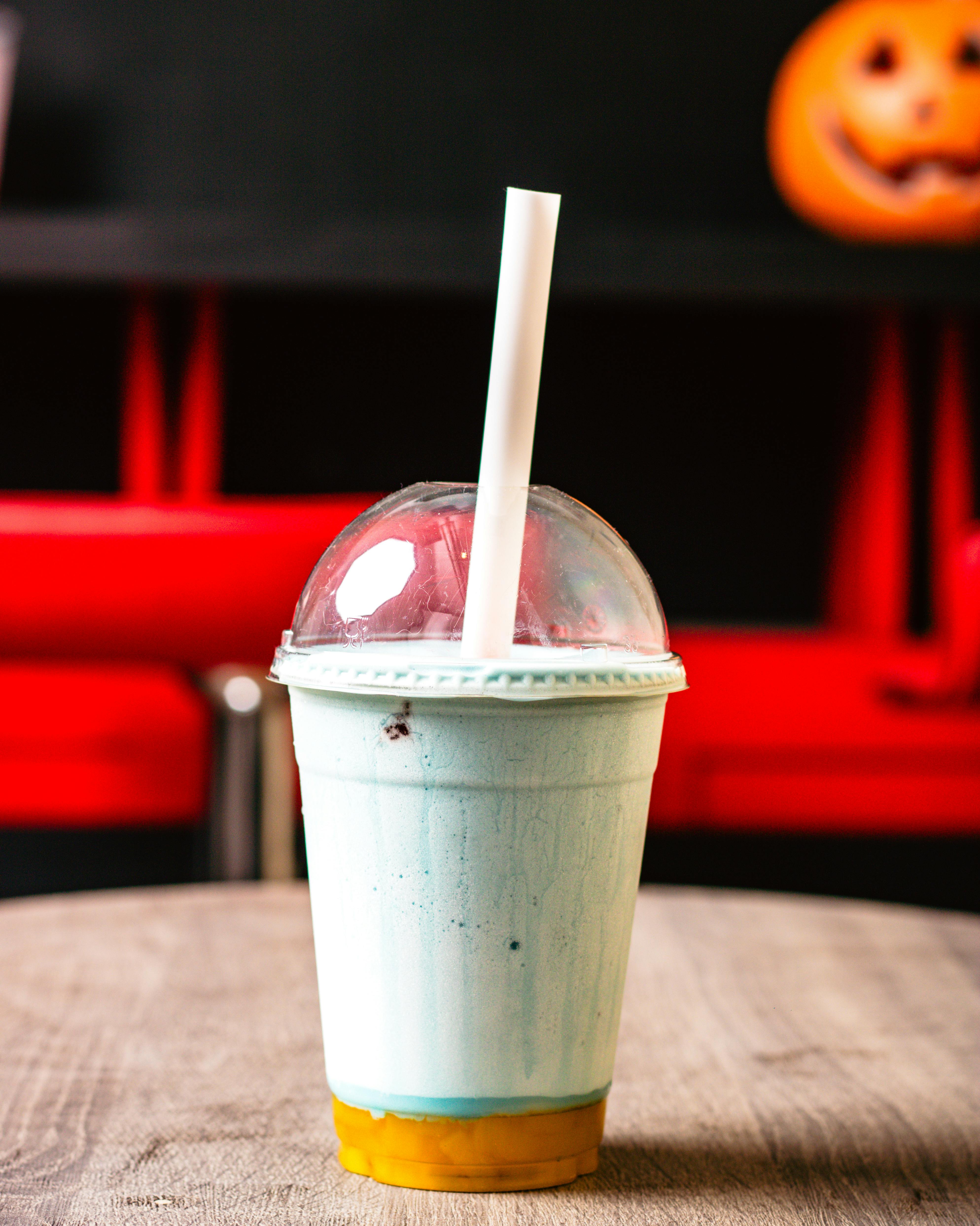 Strawberry Shake with Whipped Cream In Plastic Cup with Straw · Free ...