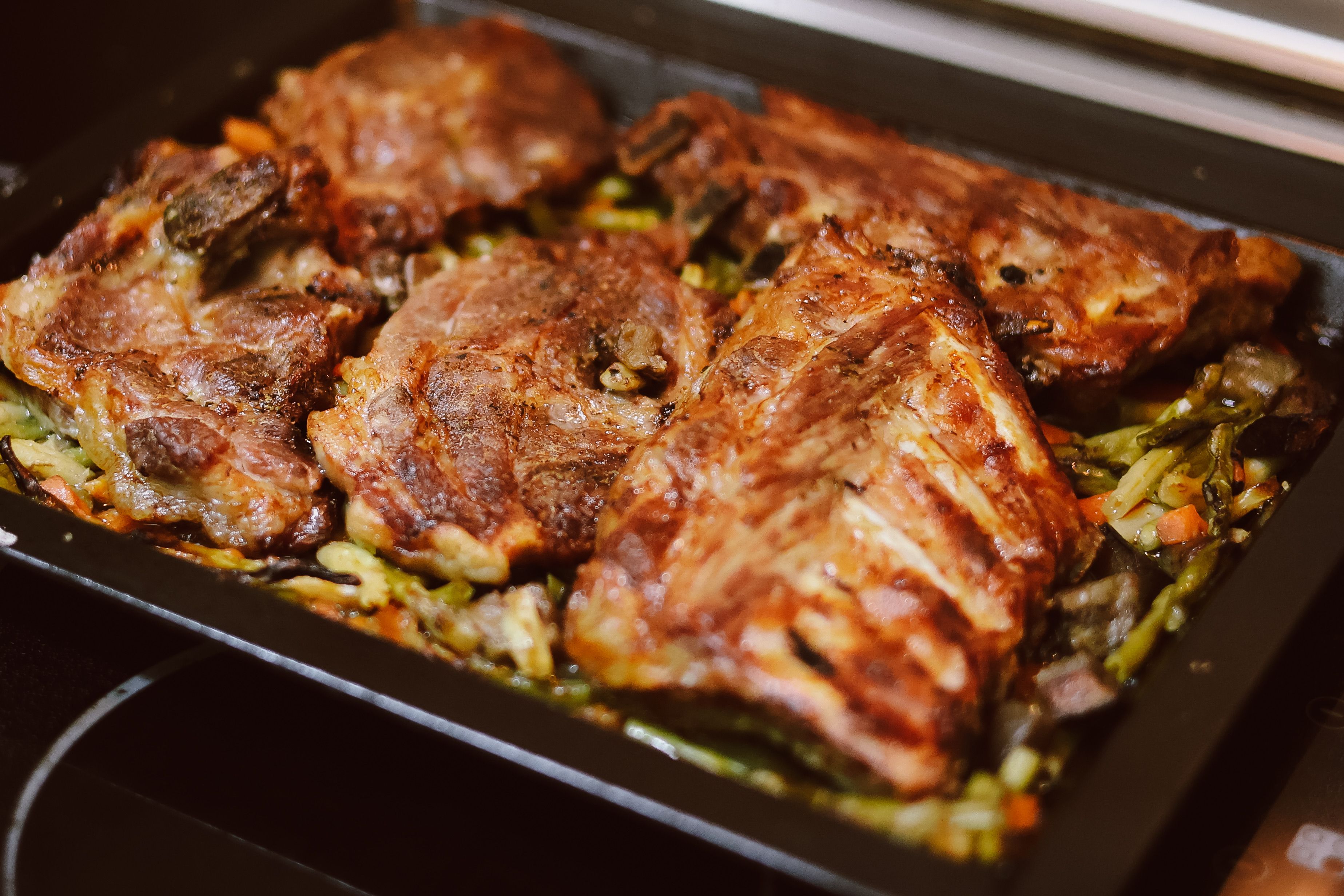 Delicious Roasted Meat with Vegetables in Oven · Free Stock Photo