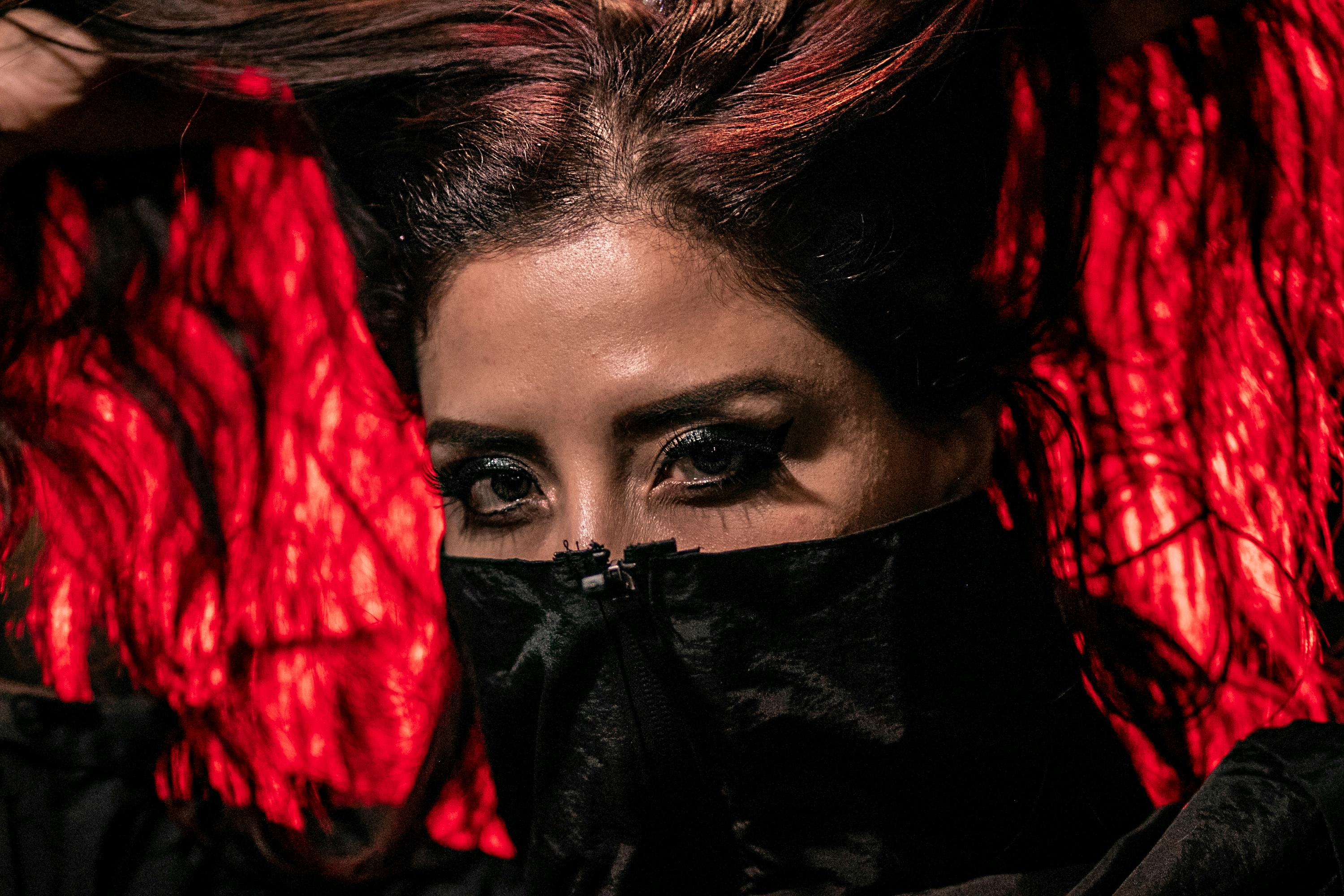 Dramatic Portrait with Red Background · Free Stock Photo