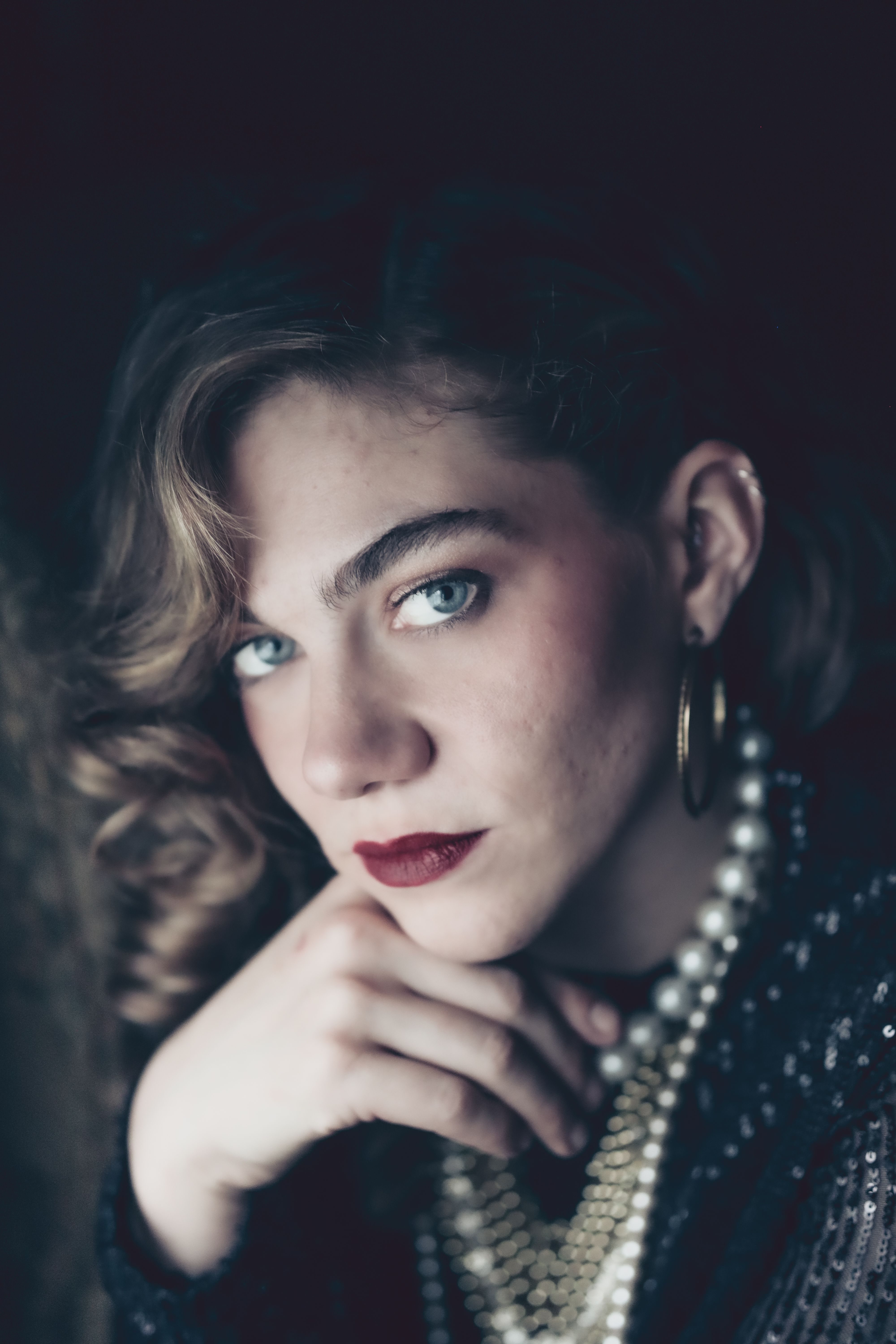Elegant Portrait of Woman in Dramatic Lighting · Free Stock Photo