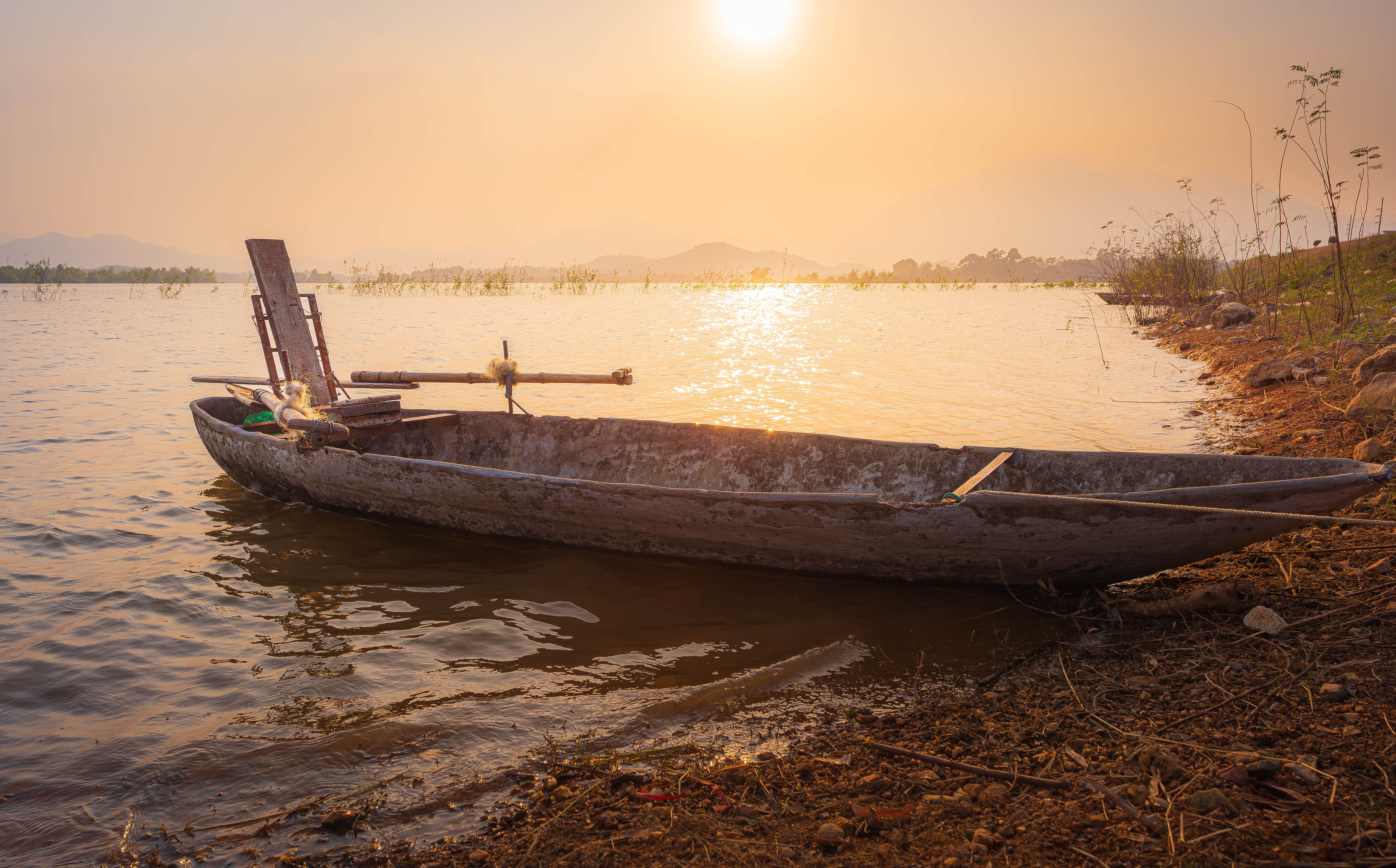 Peaceful Vietnamese boat scene at sunset · Free Stock Photo