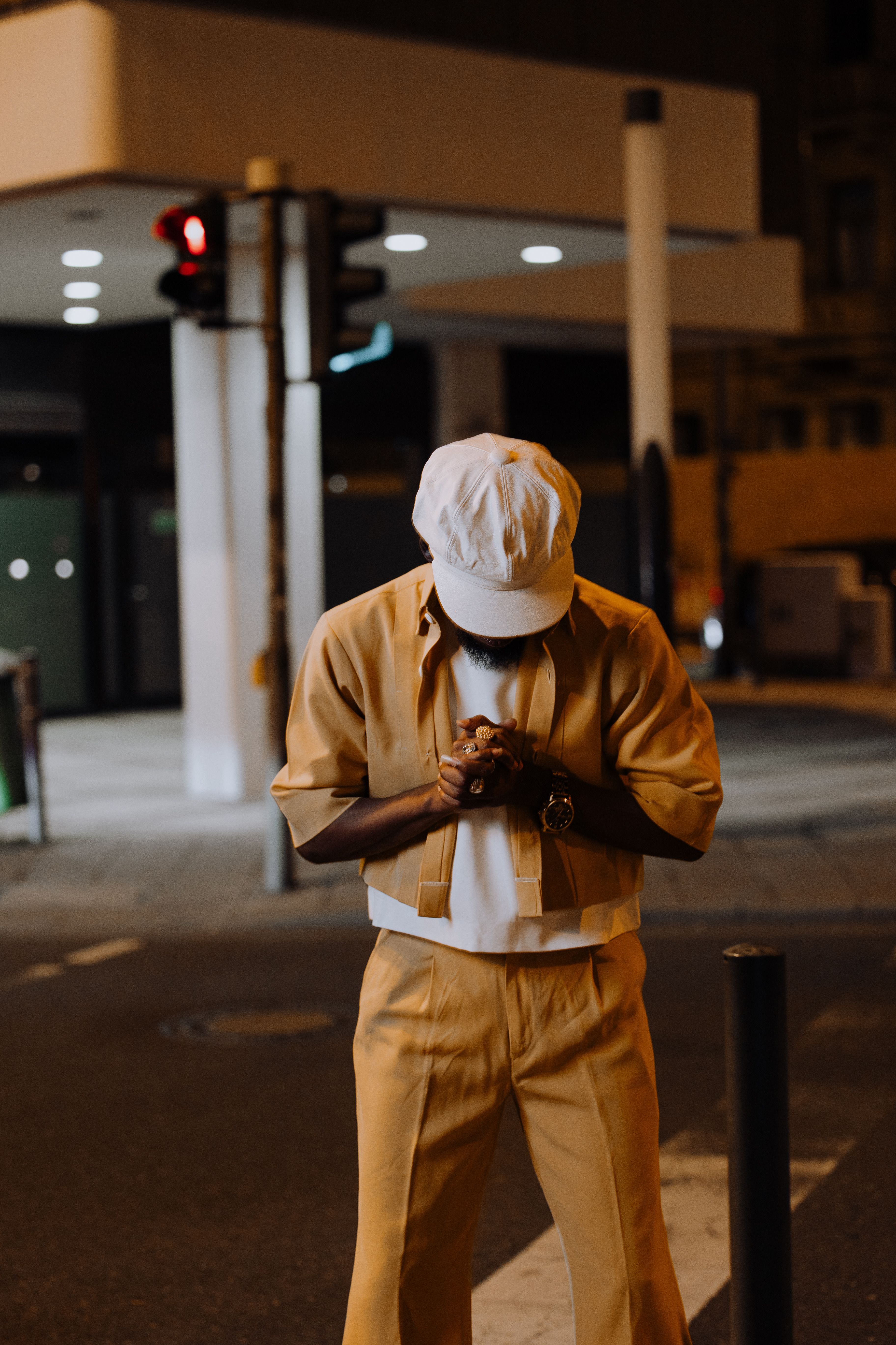 Stylish Man Posing at Night on Urban Street · Free Stock Photo