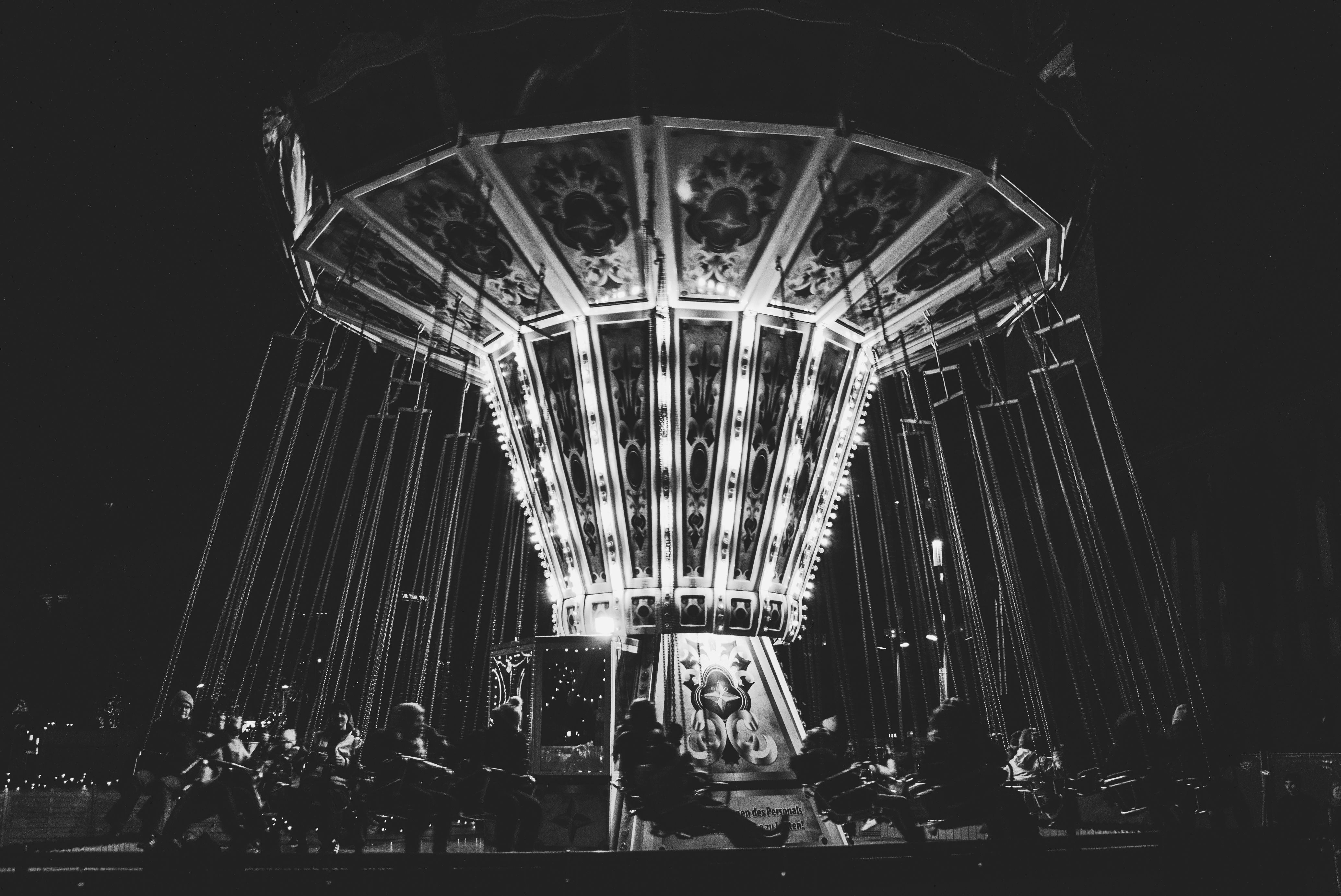 Spinning Carousel in Black and White · Free Stock Photo