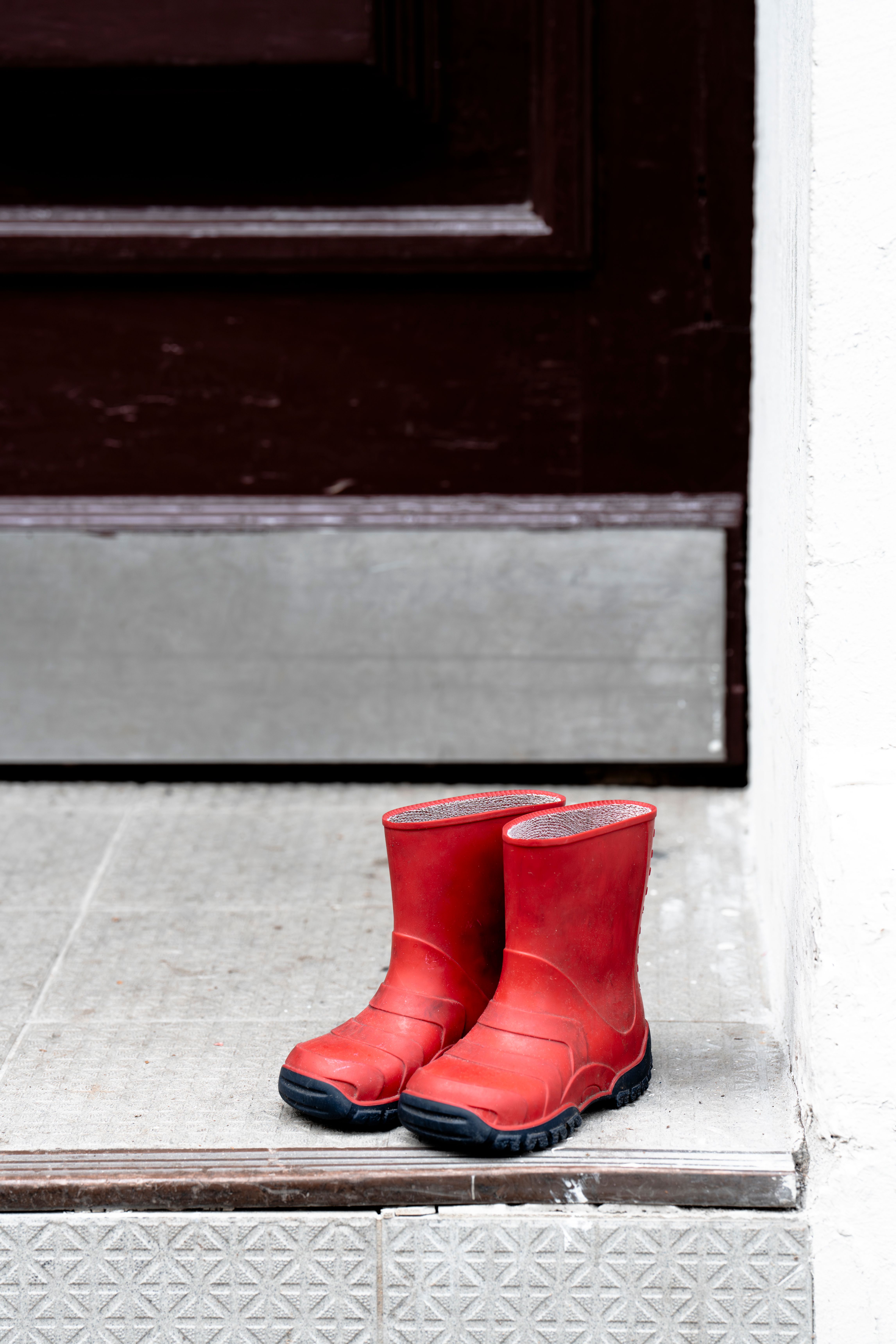 Pair of Red Rubber Boots on Doorstep · Free Stock Photo