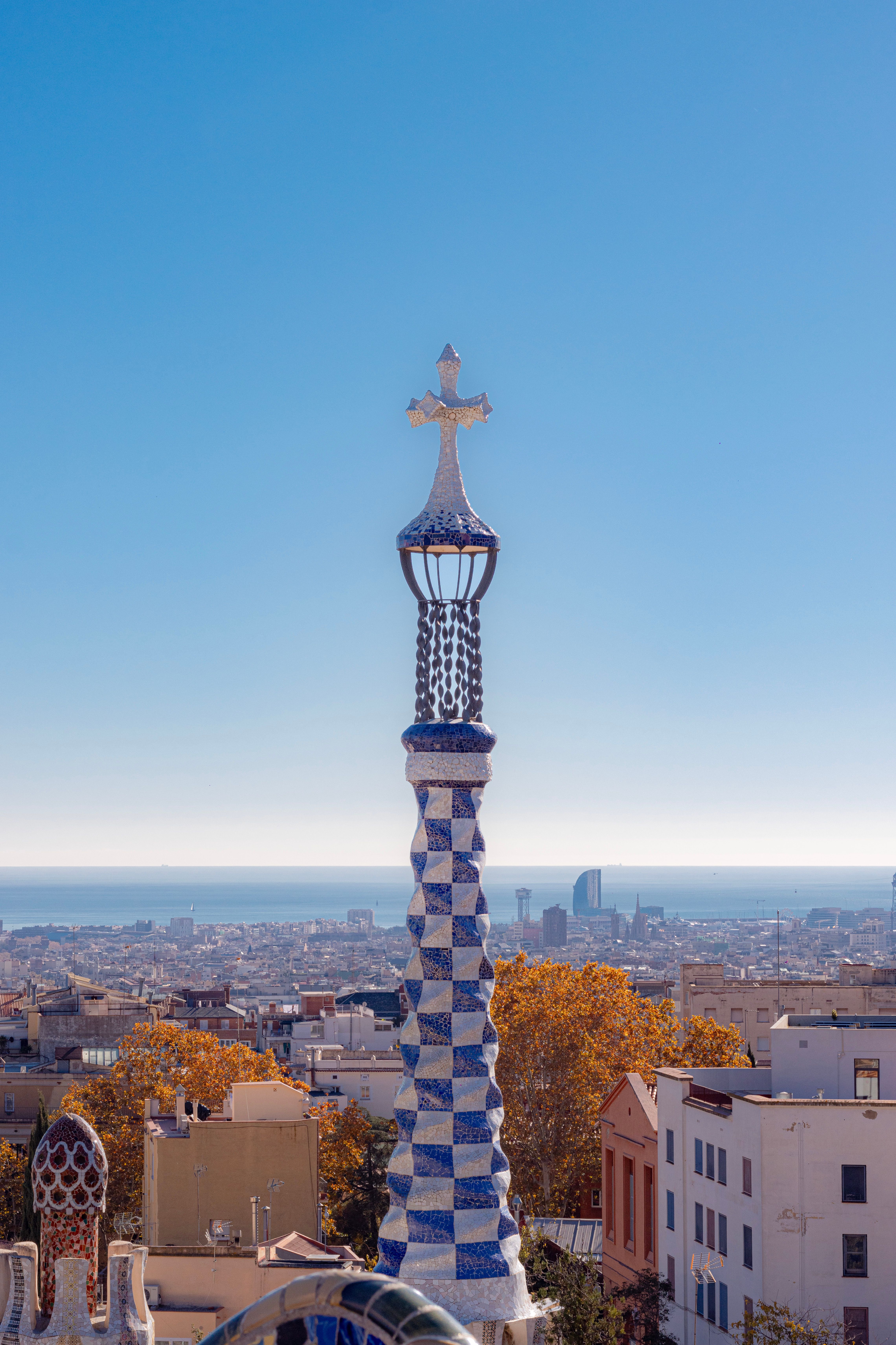 Iconic Gaudí Spire in Barcelona Skyline View · Free Stock Photo