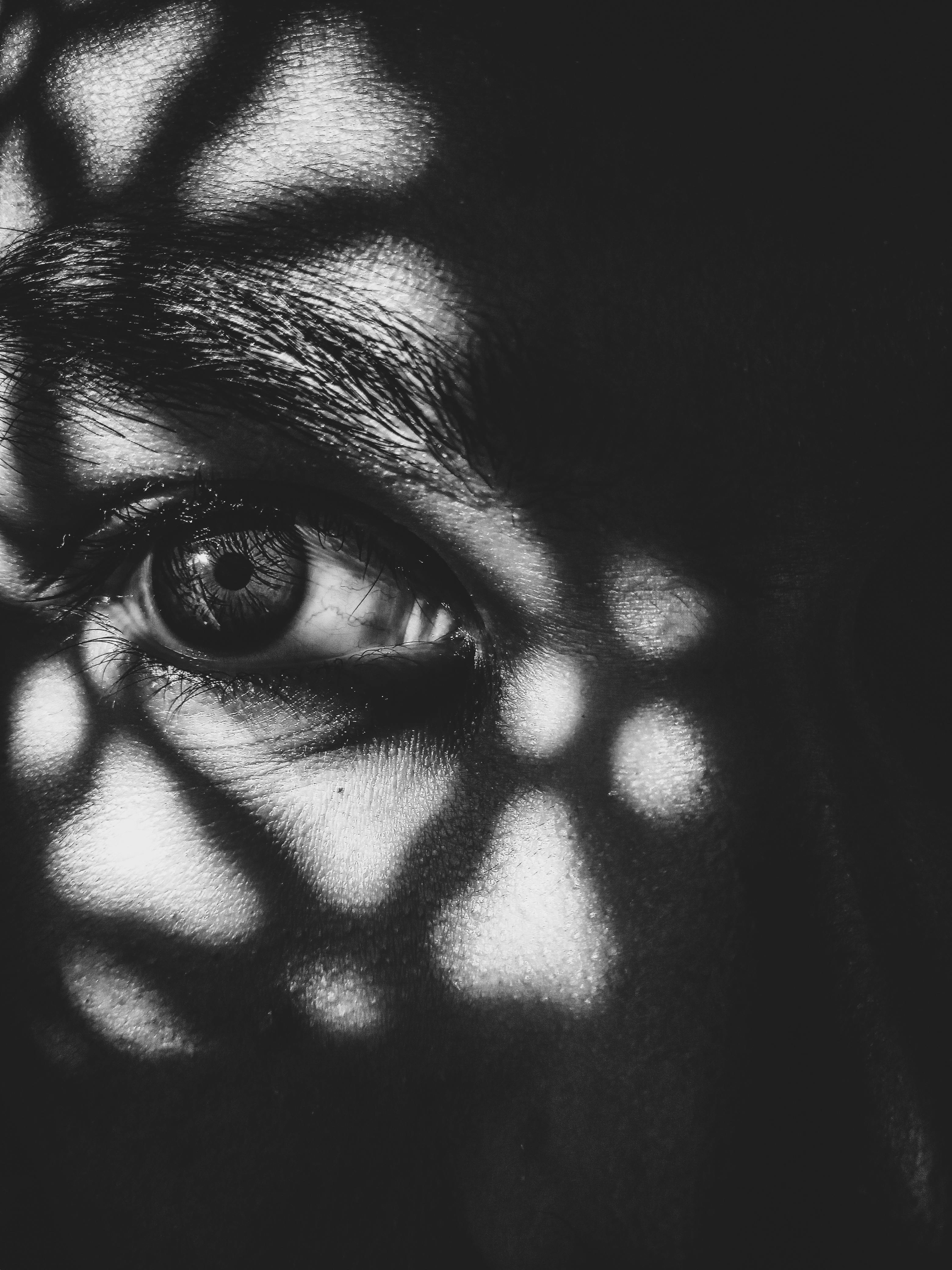 Mystical Eye in Shadows and Light Patterns · Free Stock Photo