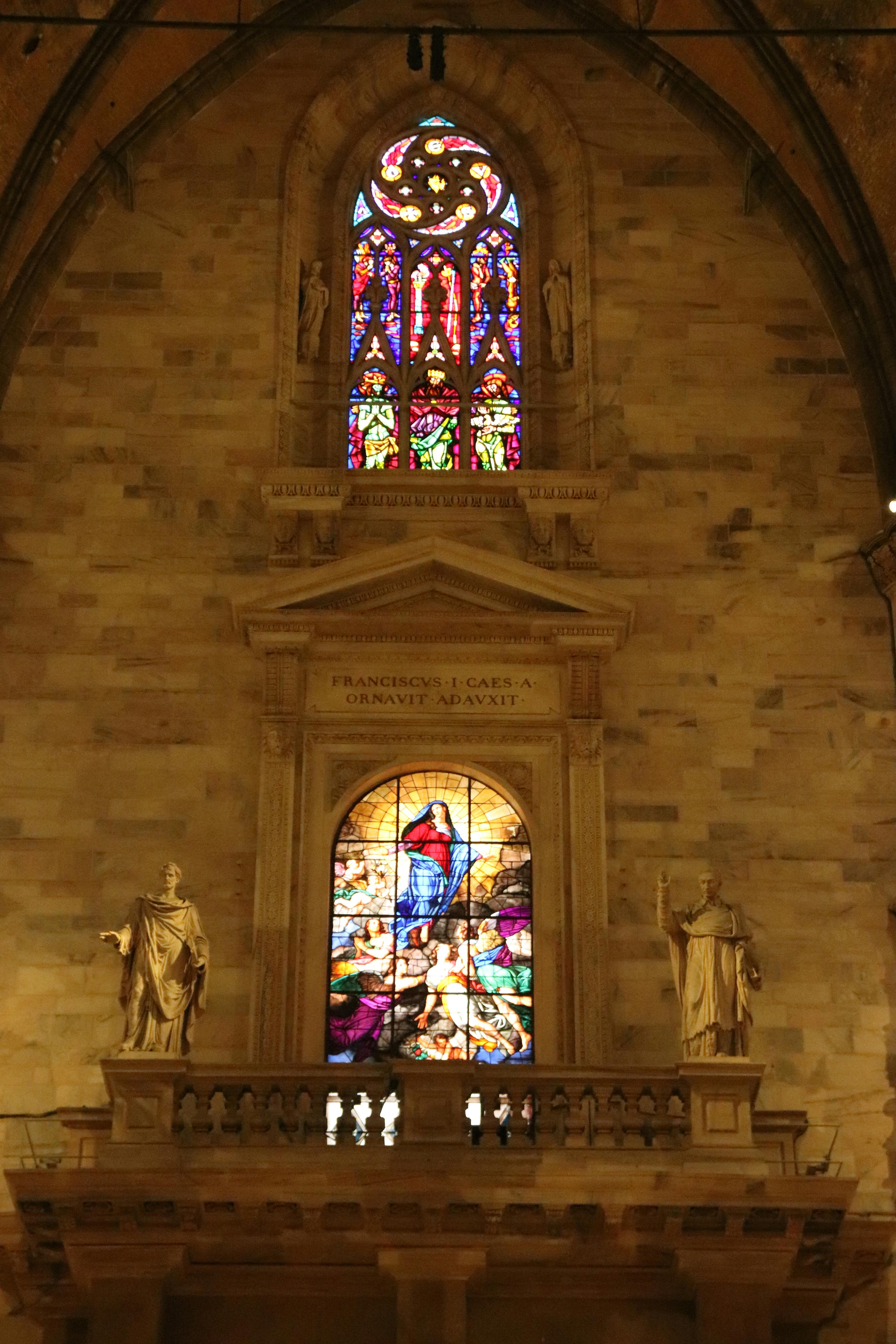 Stained Glass and Statues in Milan Cathedral · Free Stock Photo