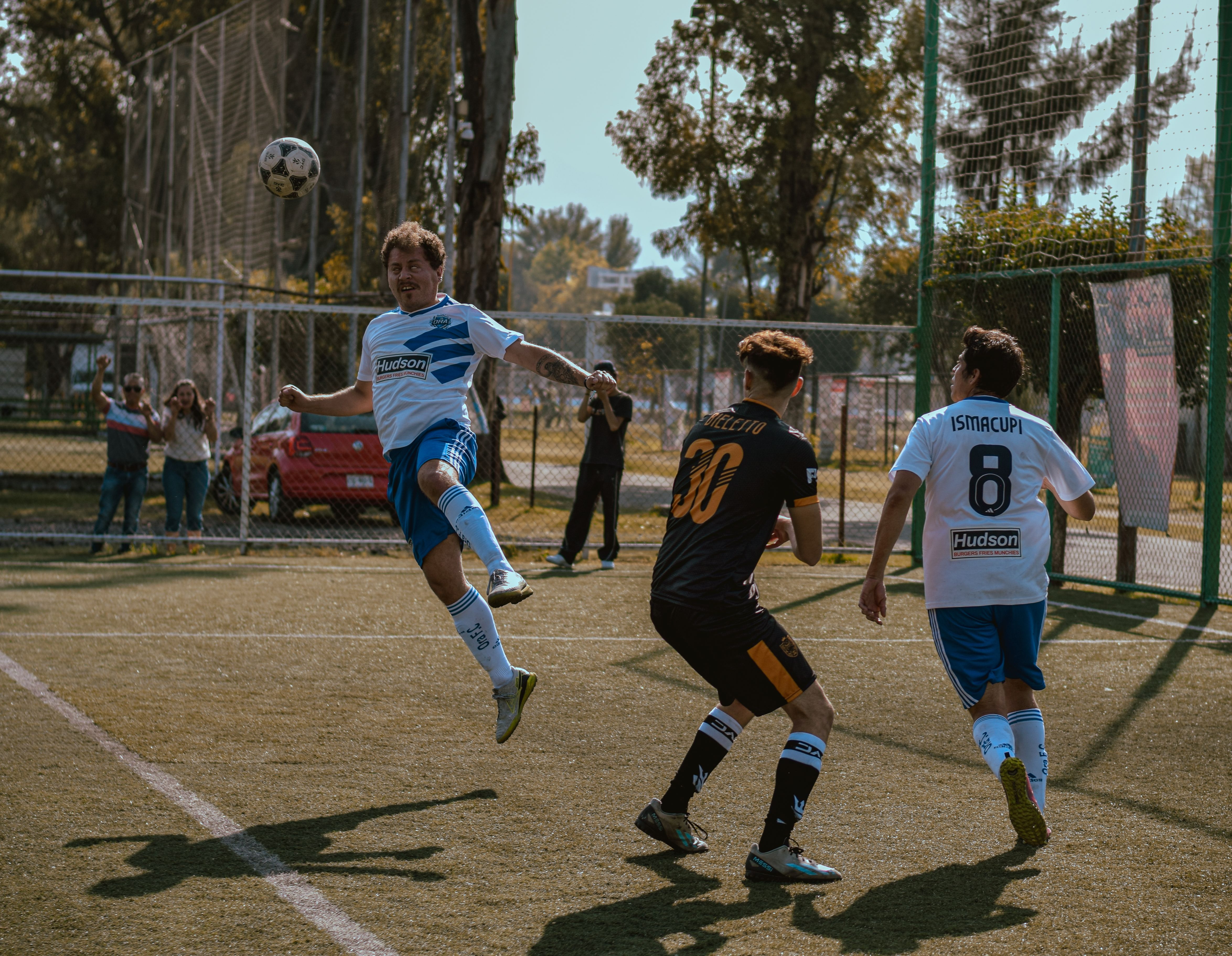 Intense Soccer Match with Dynamic Moments · Free Stock Photo