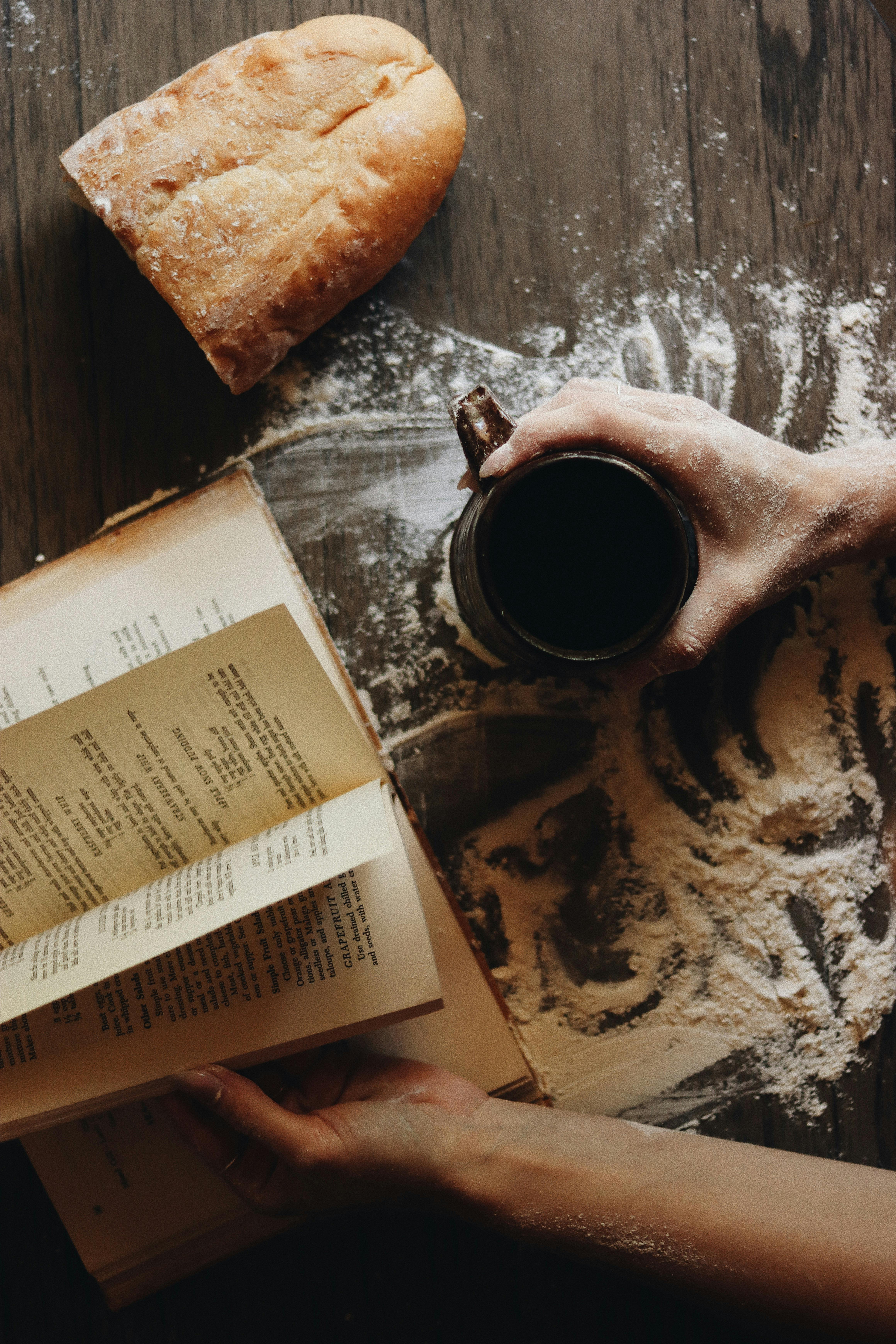 Rustic Baking Scene with Coffee and Recipe Book · Free Stock Photo