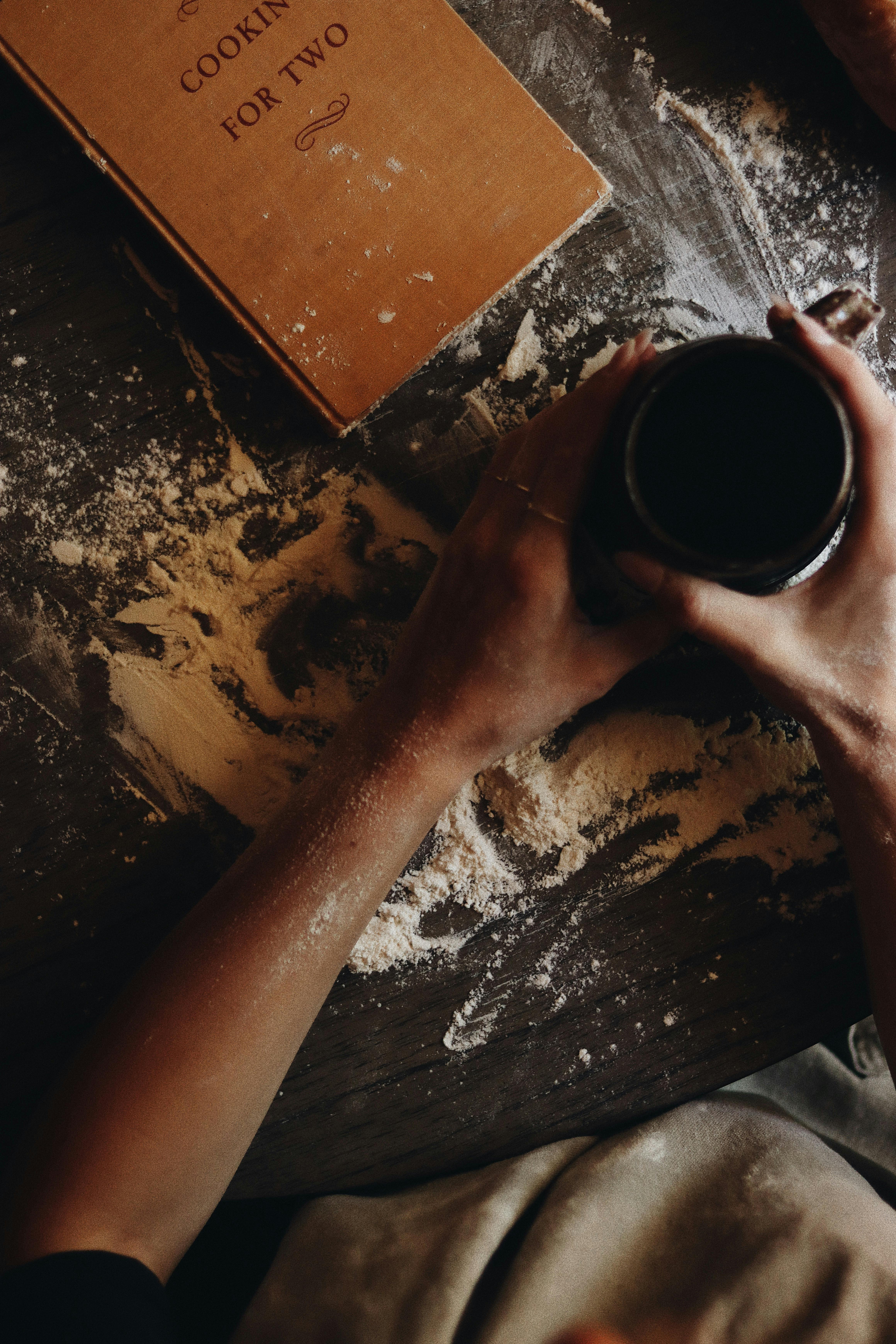 Rustic Baking Scene with Coffee and Cookbook · Free Stock Photo