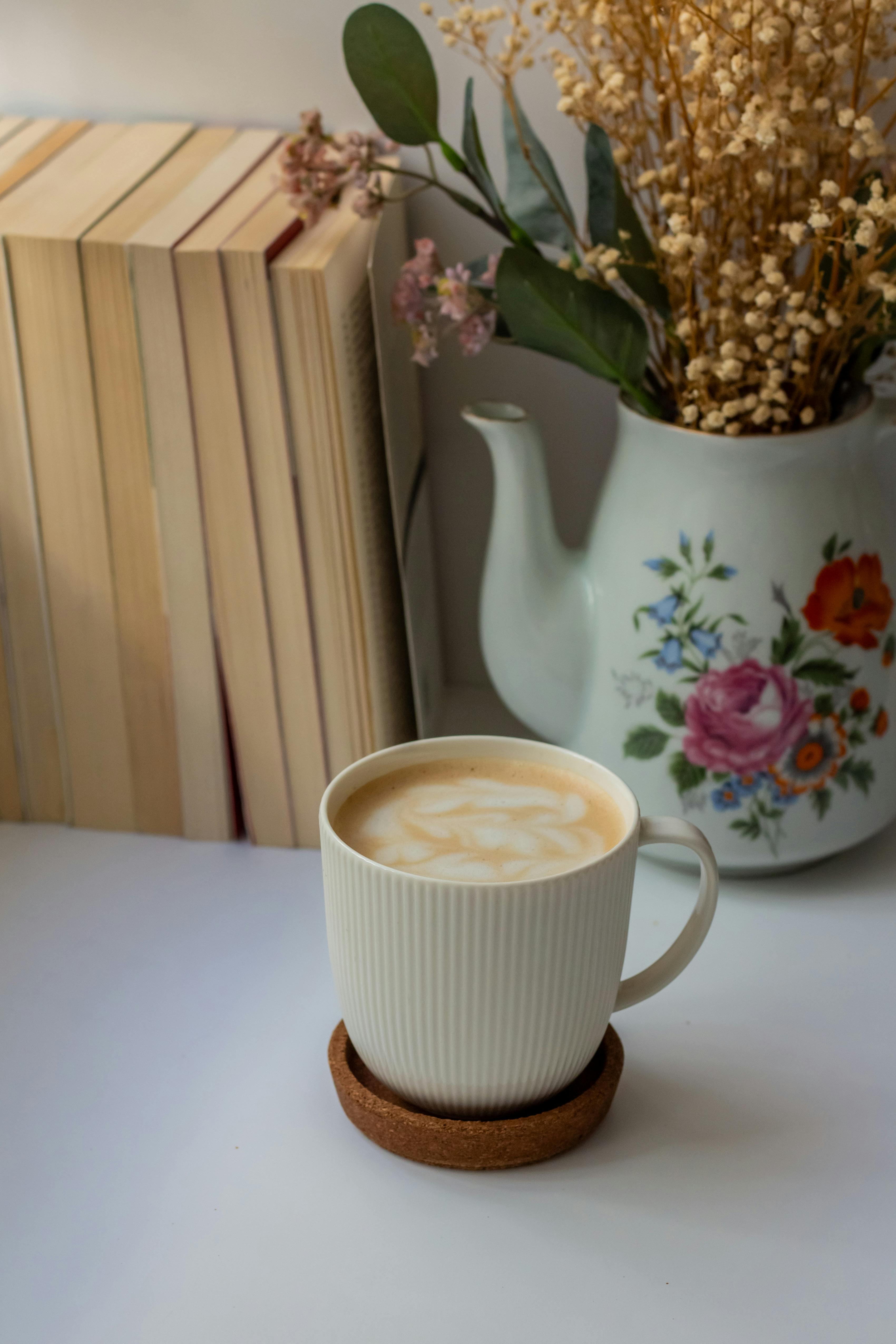 Cozy Morning Coffee with Floral Decor · Free Stock Photo