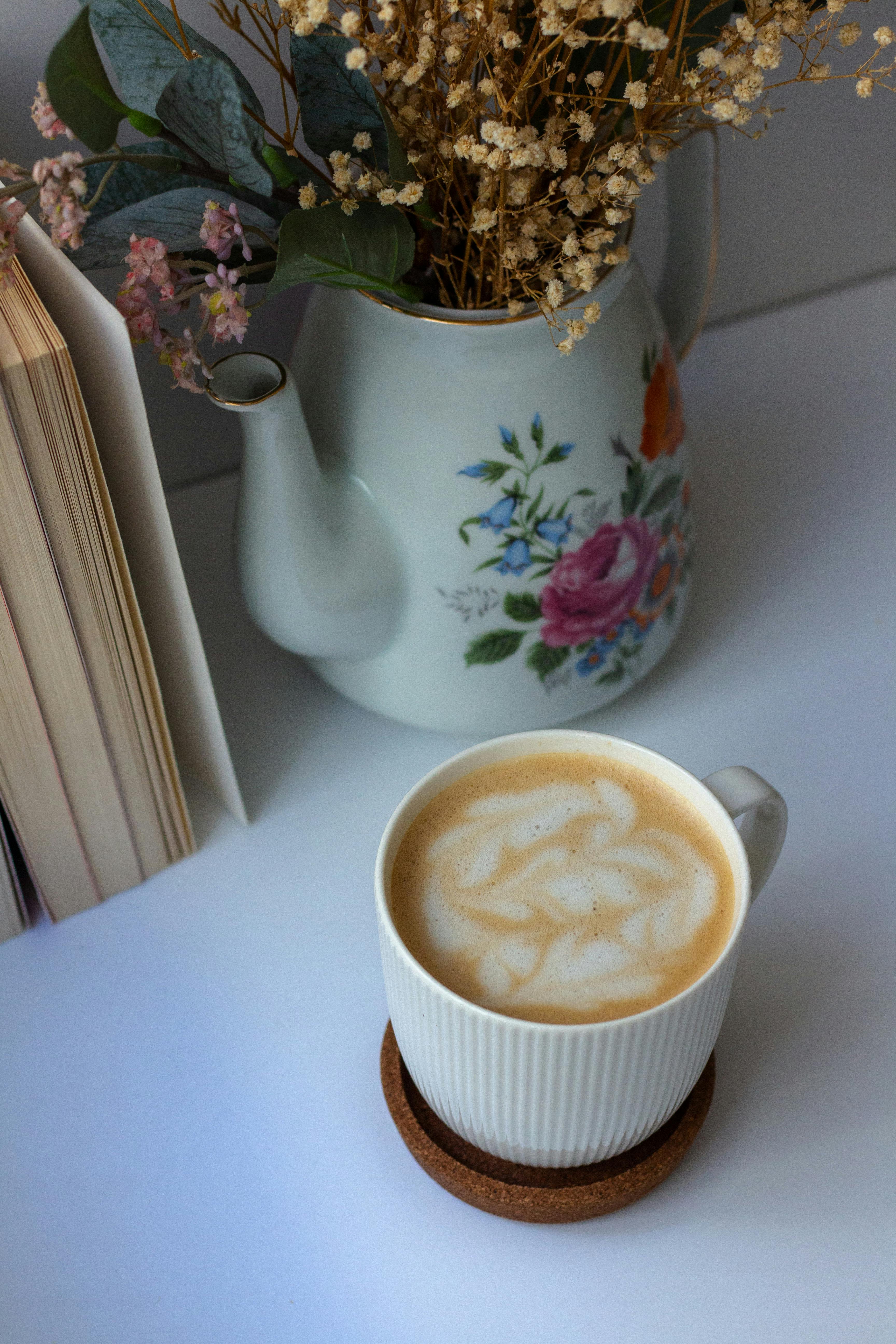 Cozy Morning Coffee with Floral Teapot · Free Stock Photo