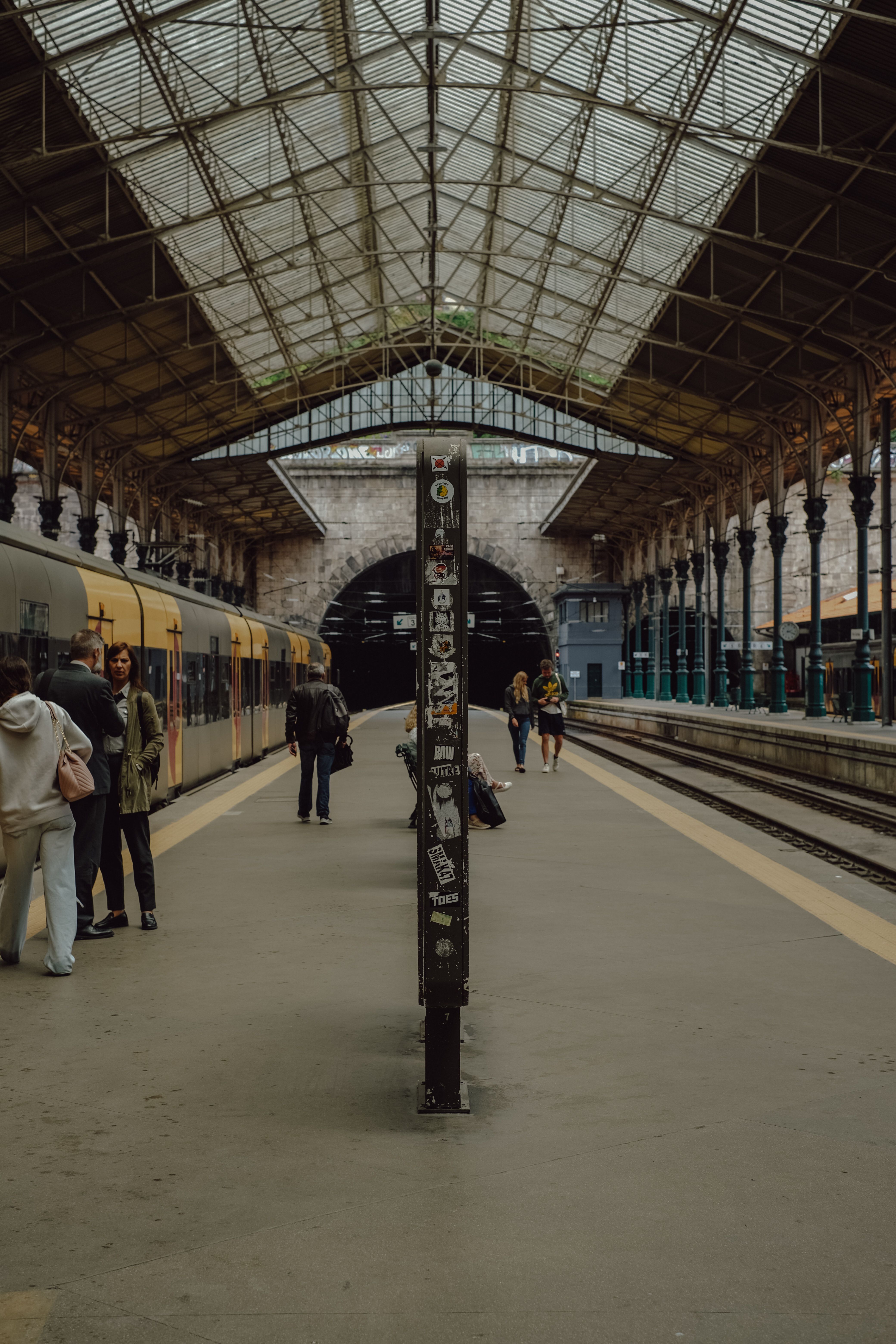 Vintage European Train Station Platform Scene · Free Stock Photo