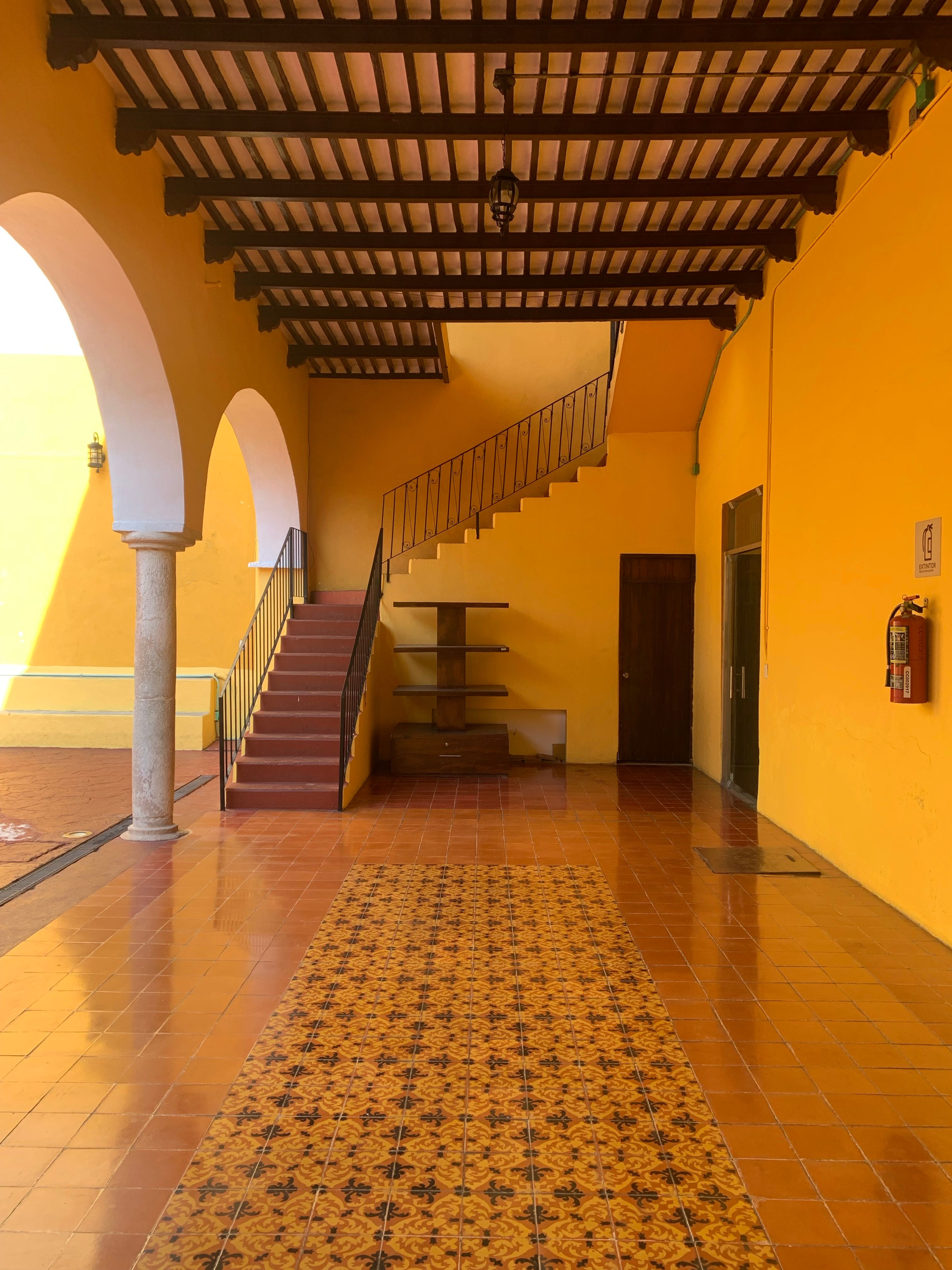 Historic Colonial Courtyard with Staircase · Free Stock Photo
