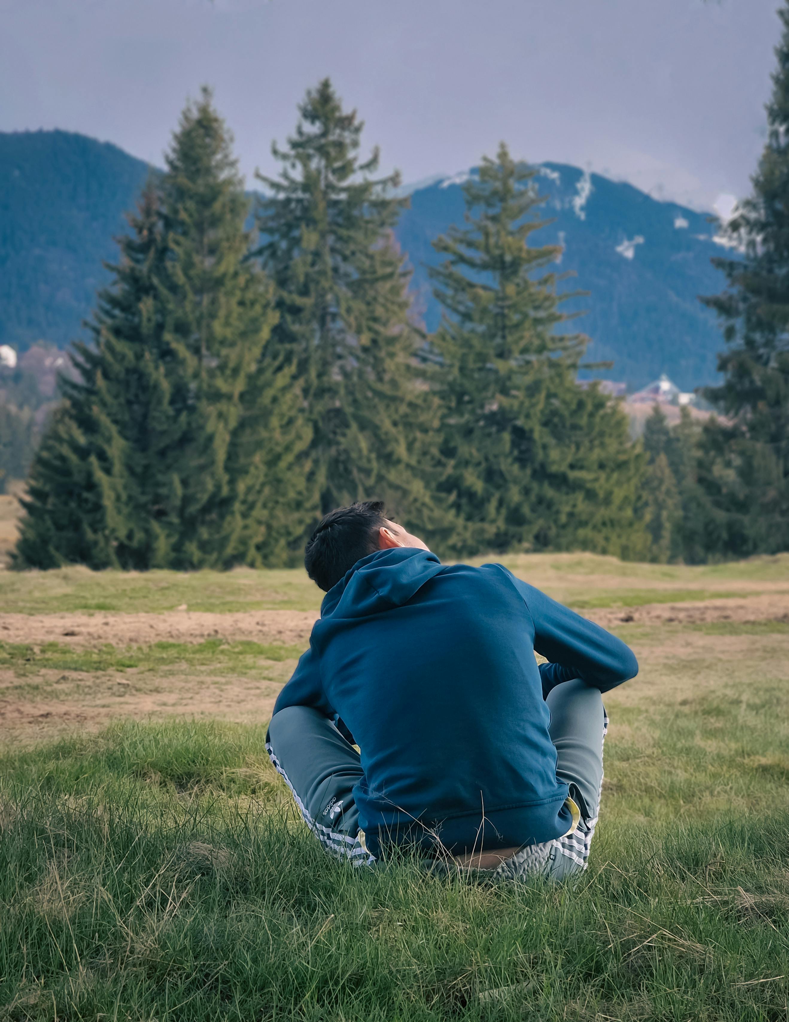Person Relaxing in Scenic Mountain Landscape · Free Stock Photo