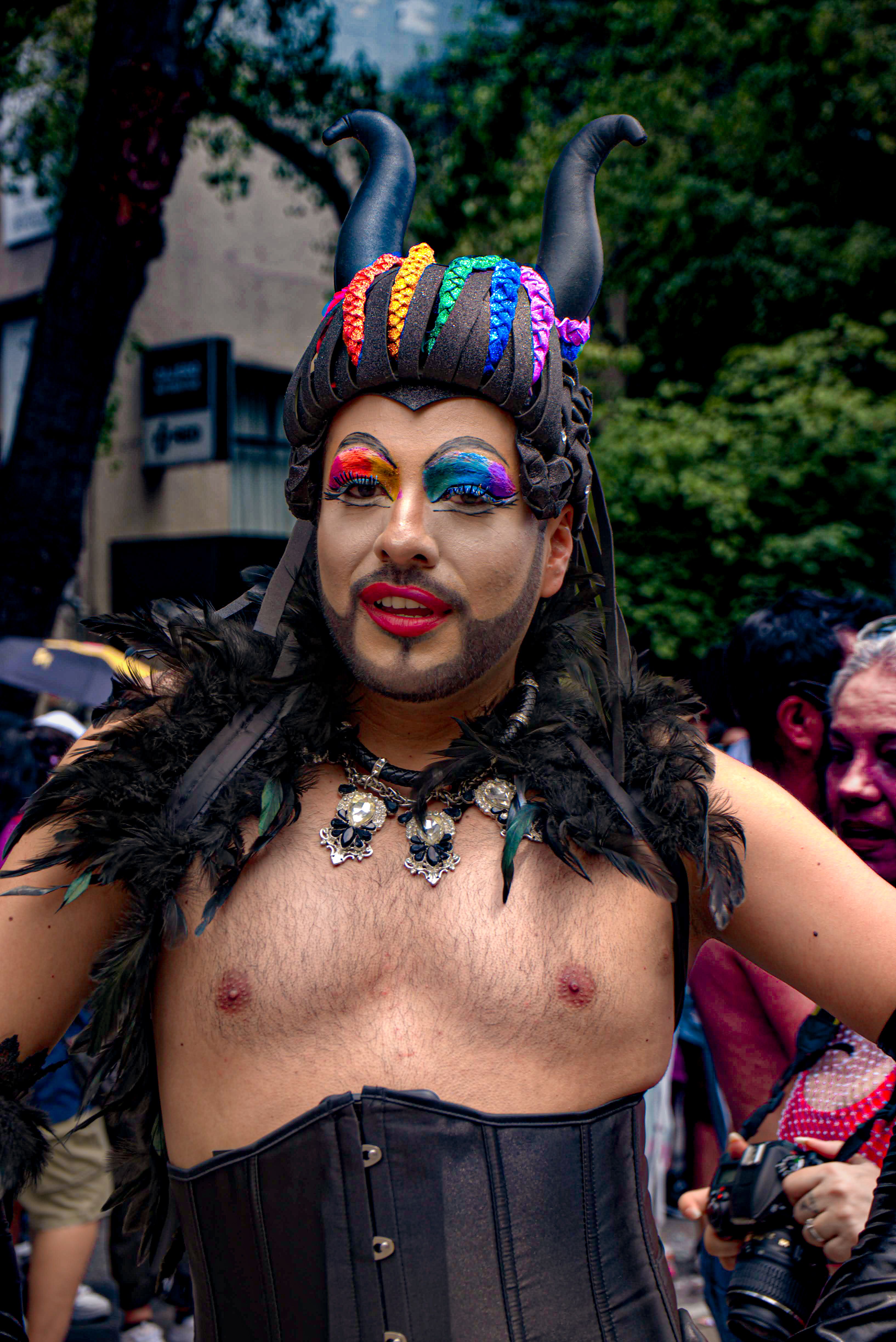 Vibrant Pride Parade Costume with Rainbow Makeup · Free Stock Photo