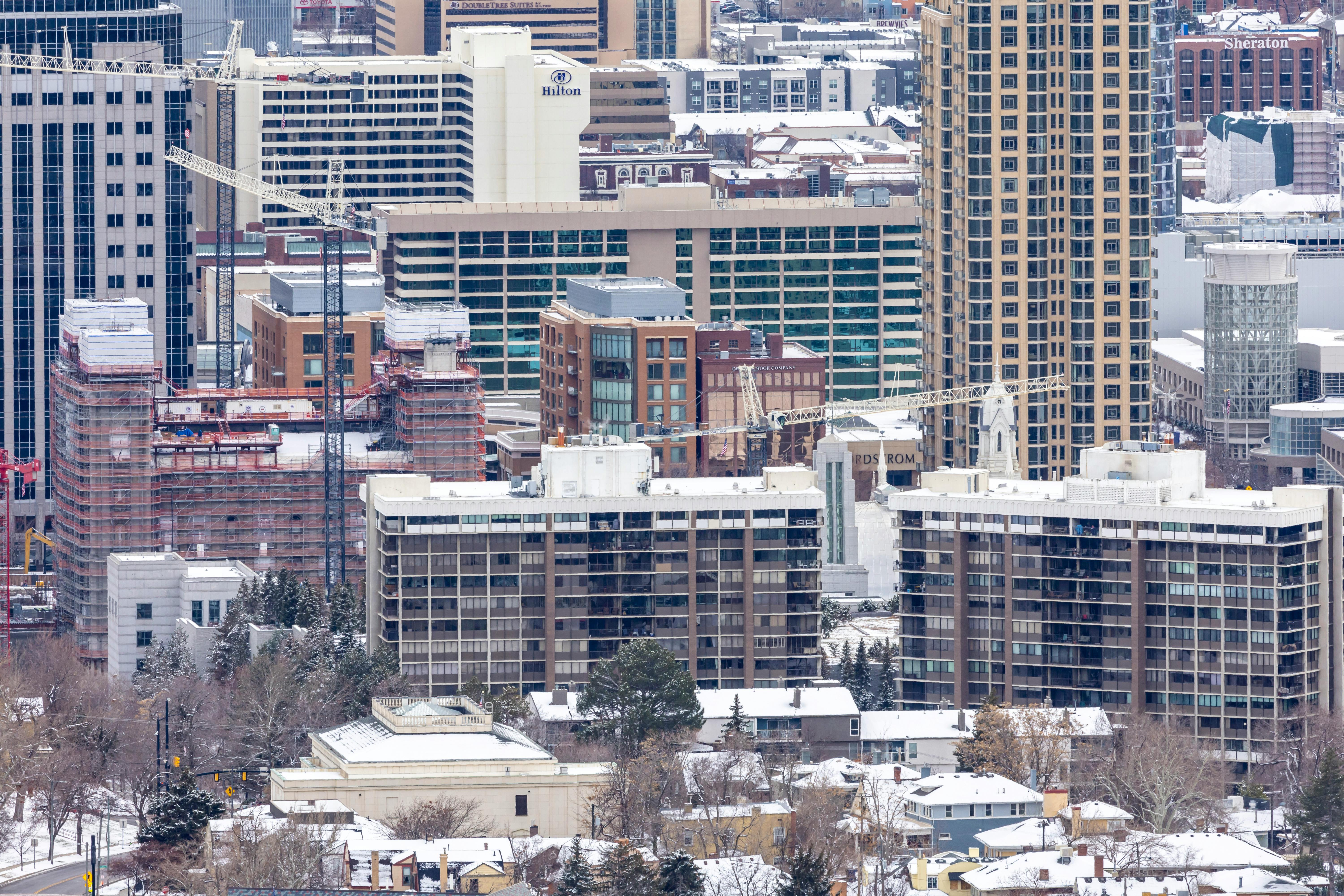 Urban Cityscape with Snow Covered Buildings · Free Stock Photo