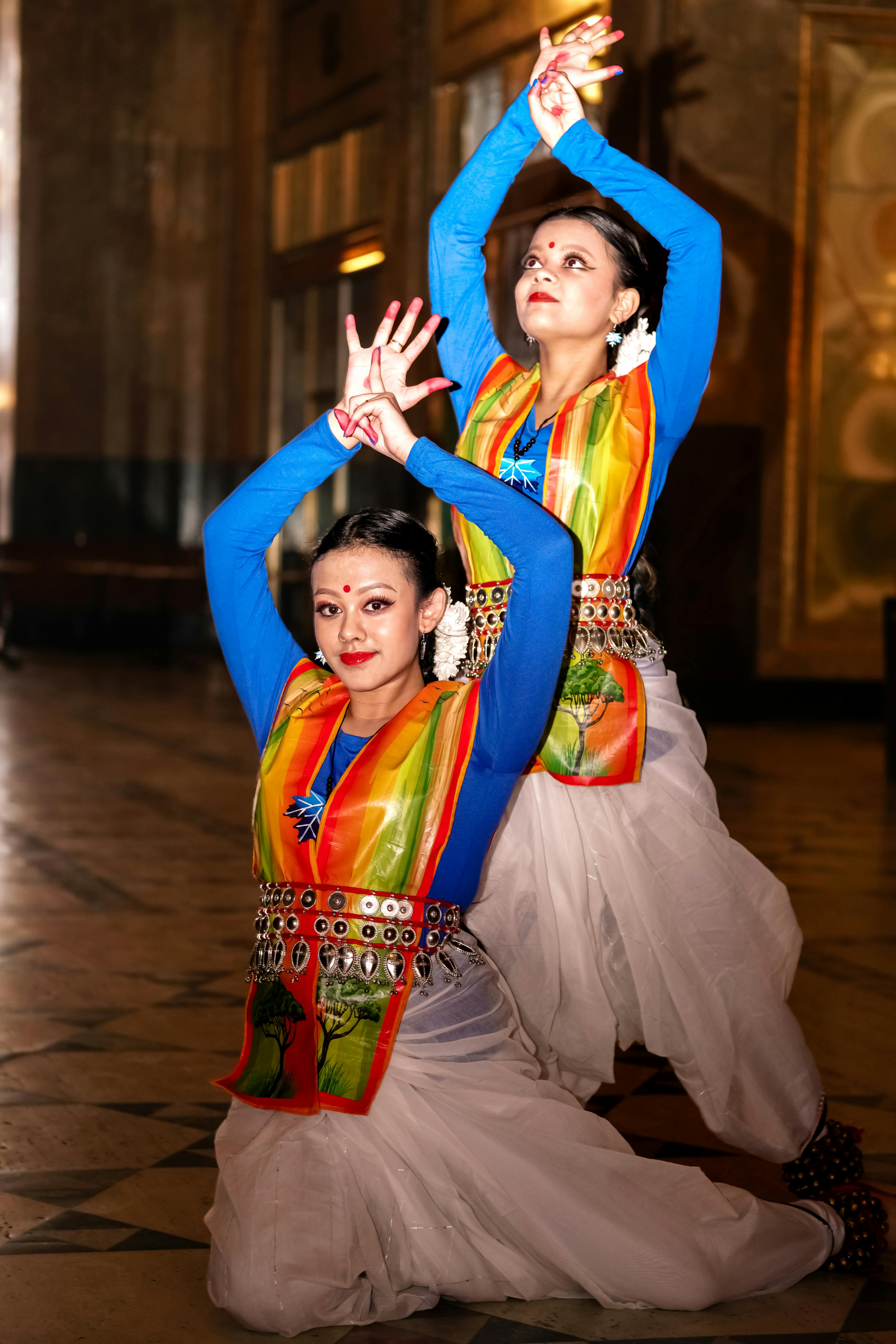 Traditional Indian Dance Performance in Vibrant Attire · Free Stock Photo