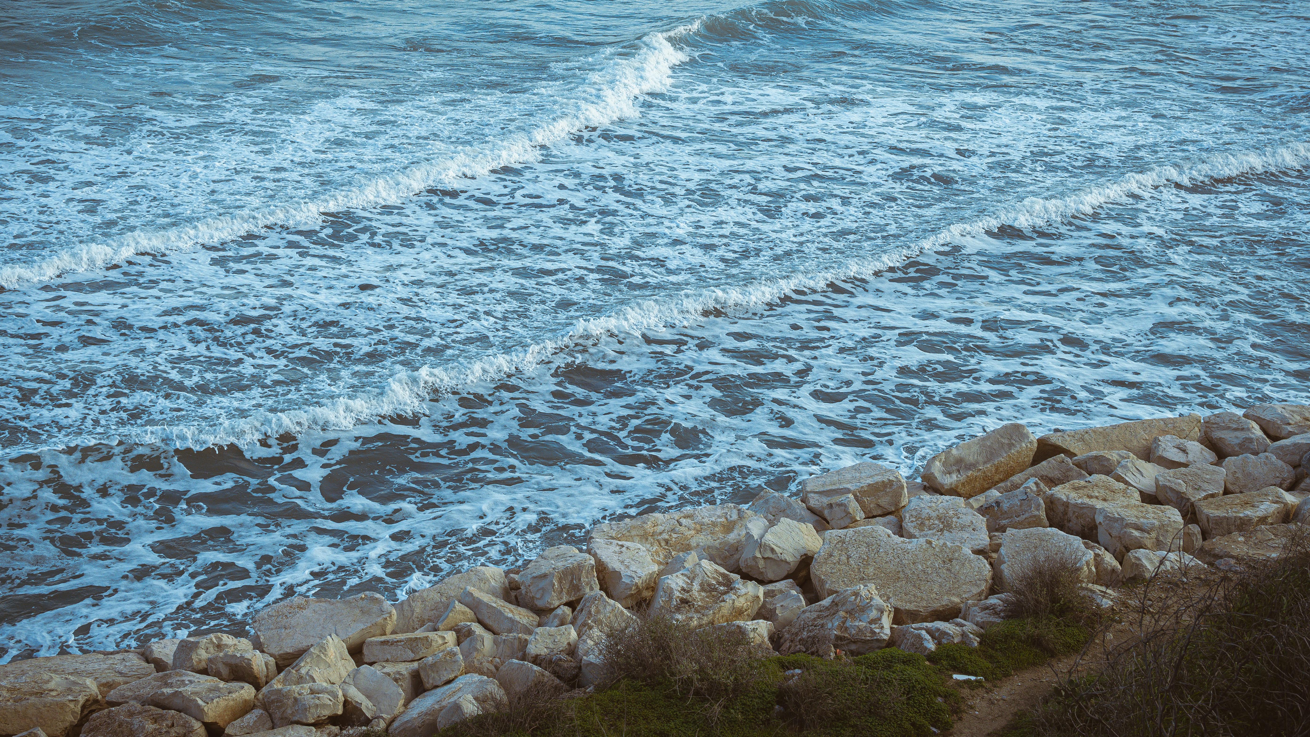 Waves Crashing on Rocky Shore in Carthage, Tunisia · Free Stock Photo