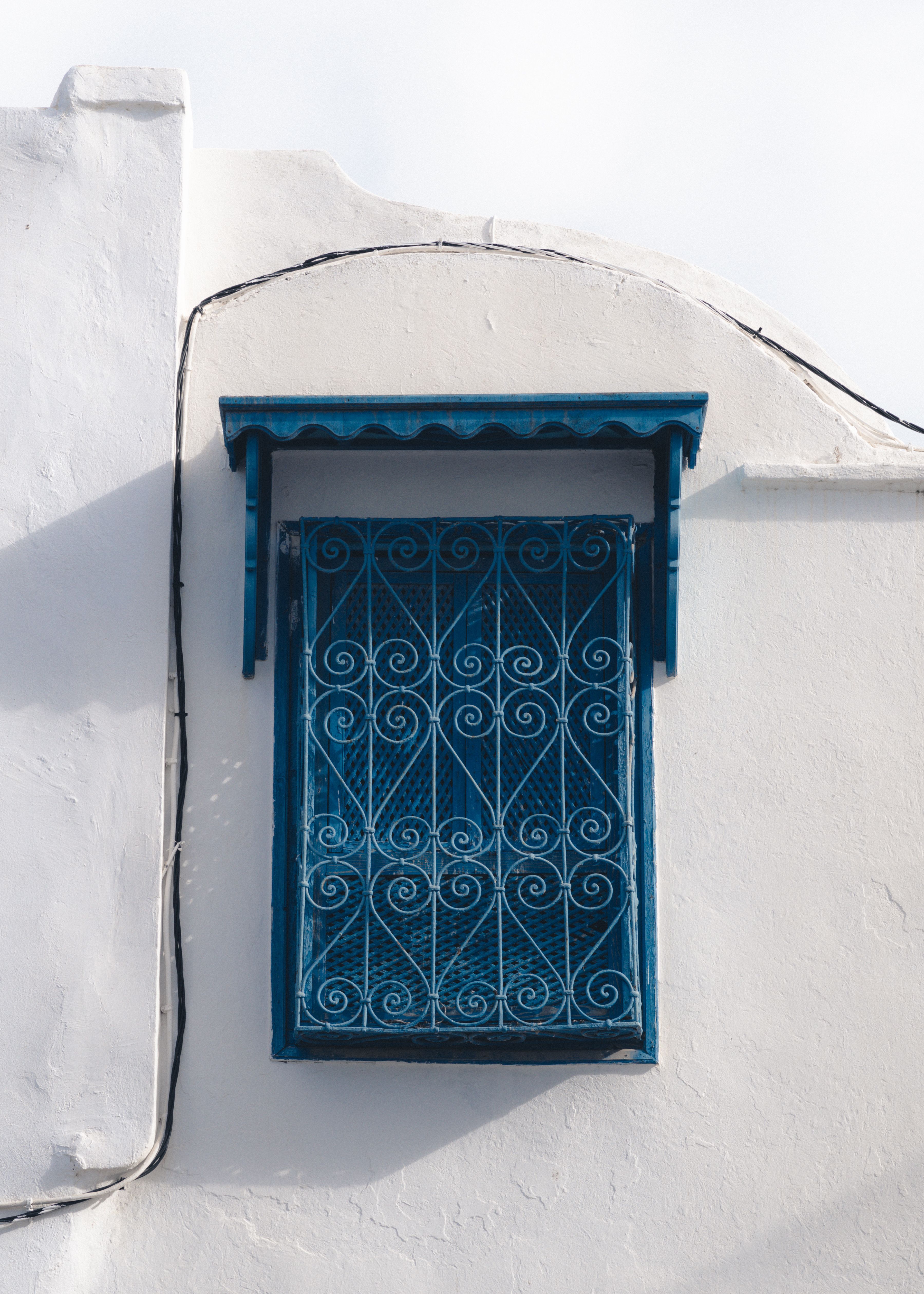 Traditional Blue Window Grille in Carthage, Tunisia · Free Stock Photo