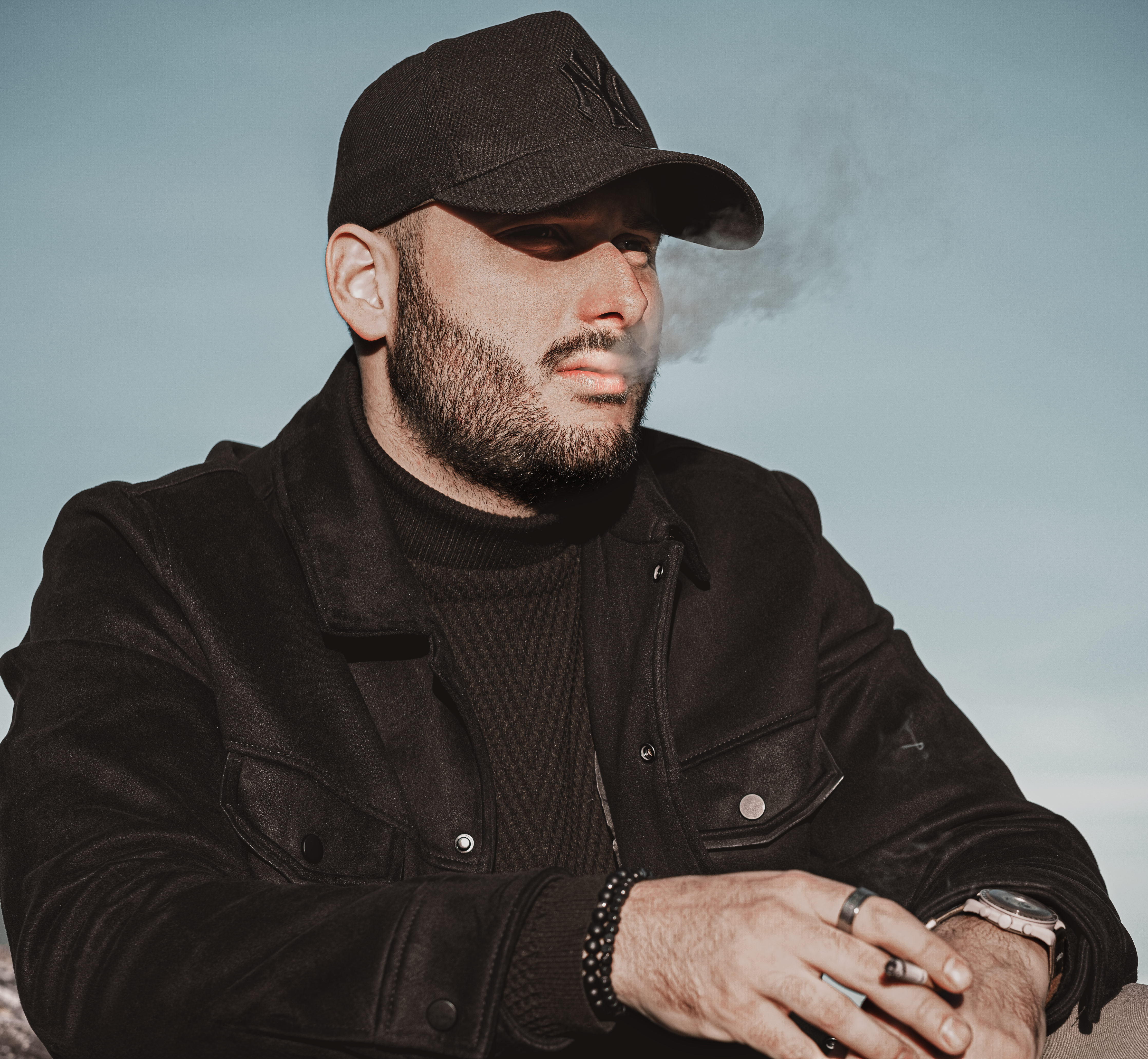 Man Smoking Outdoors in Sion, Switzerland · Free Stock Photo