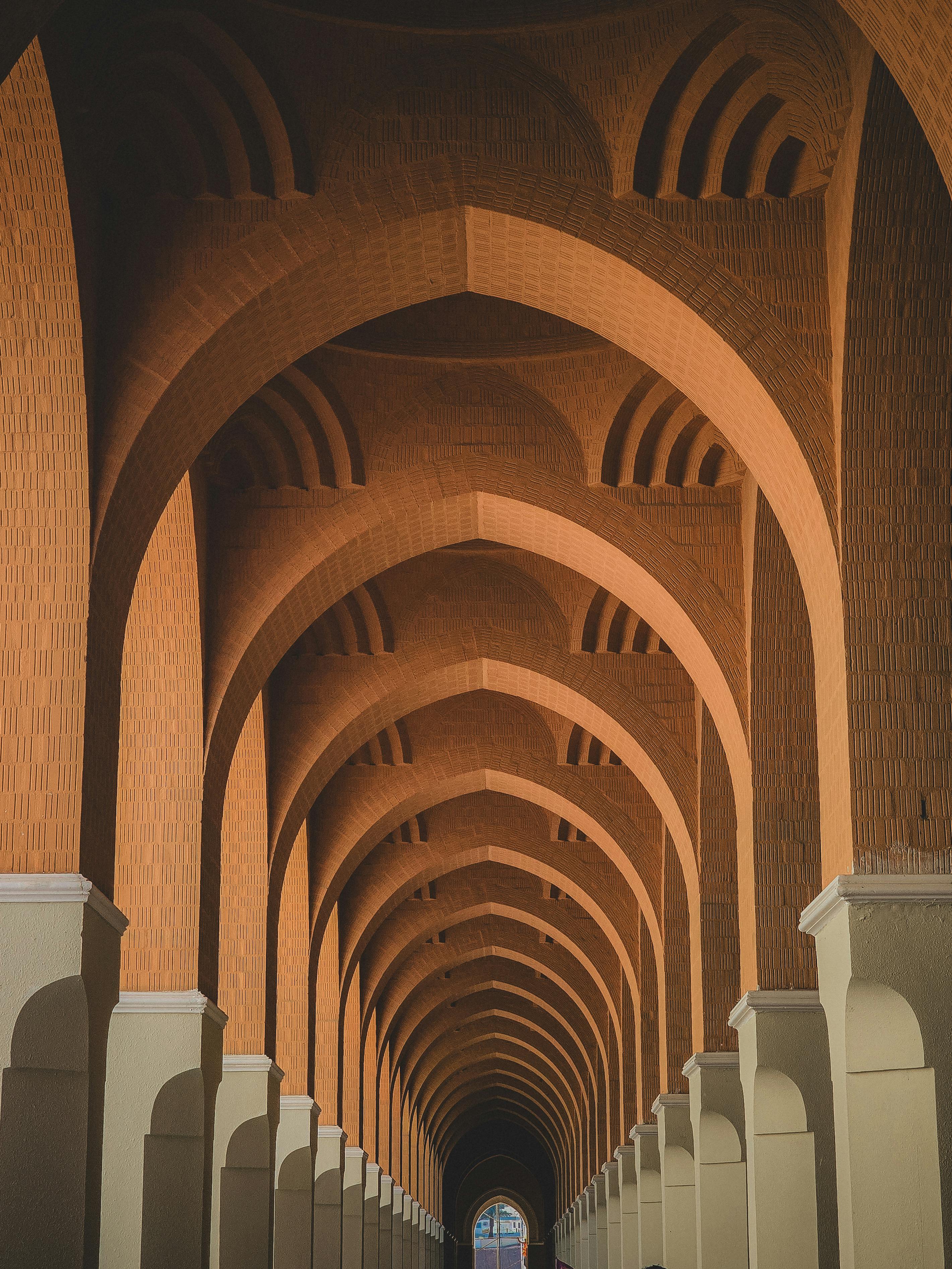 Elegant Architectural Archway with Repeated Patterns · Free Stock Photo