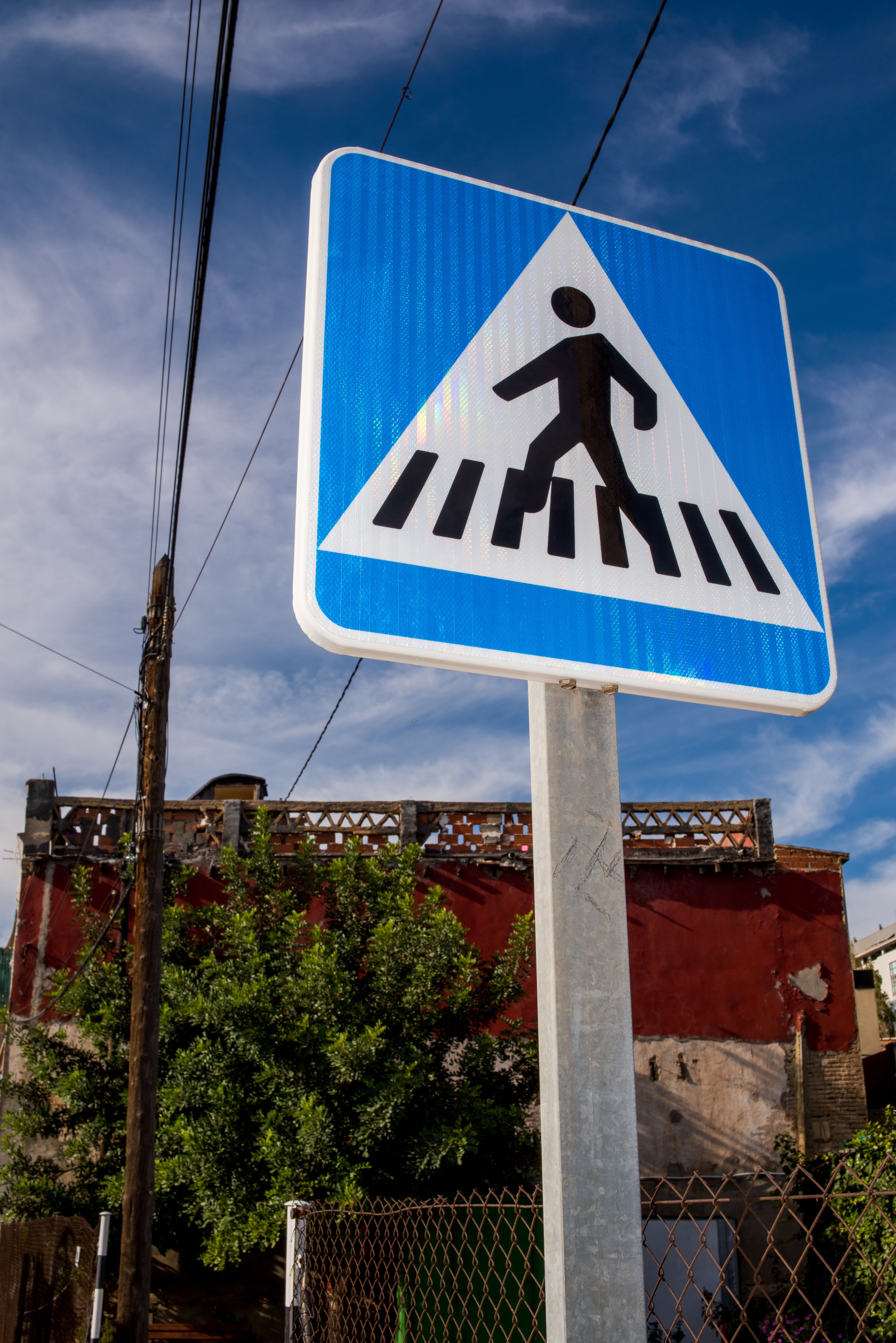Pedestrian Crossing Sign on Urban Street · Free Stock Photo