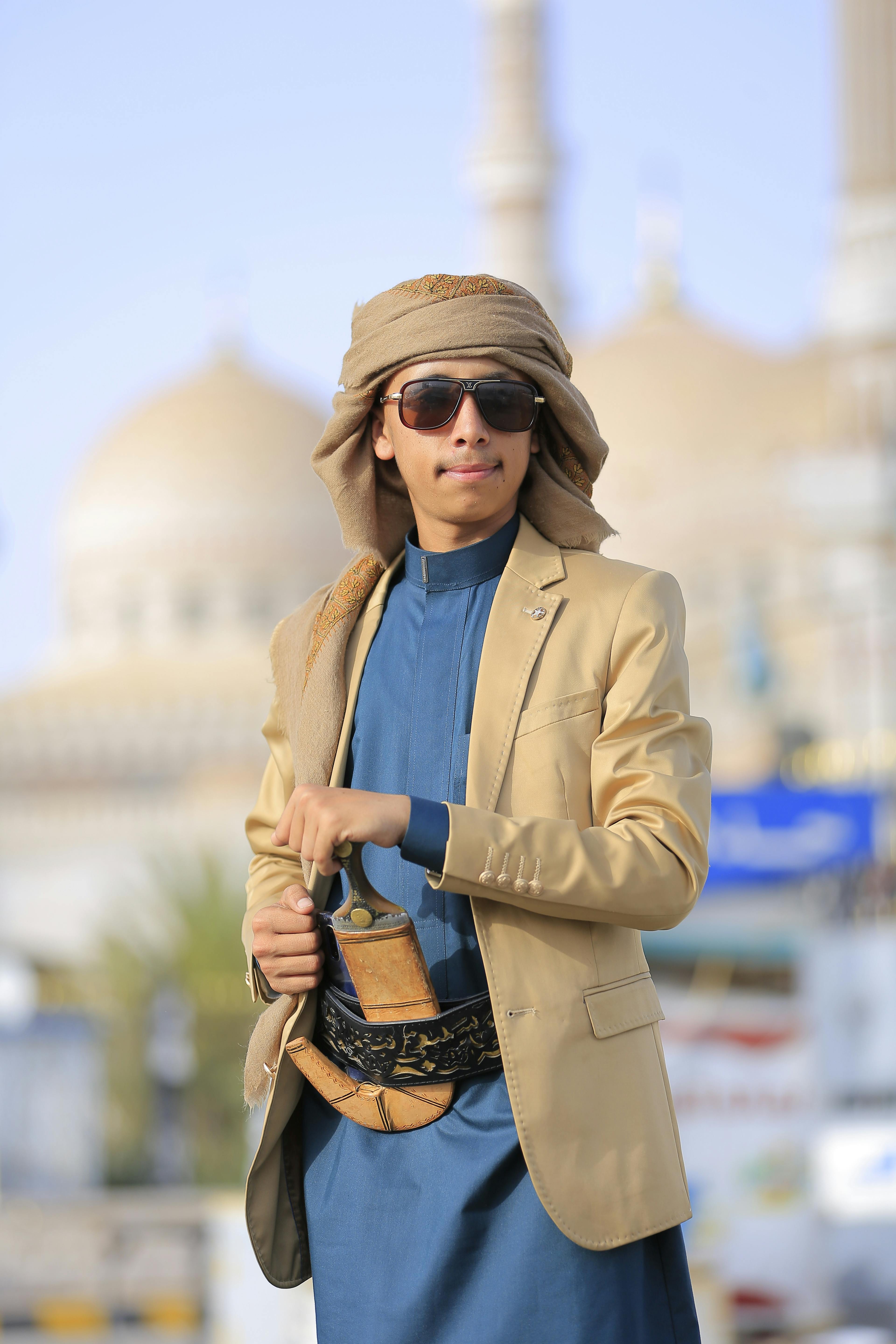 Traditional Middle Eastern Attire with Jambiya · Free Stock Photo