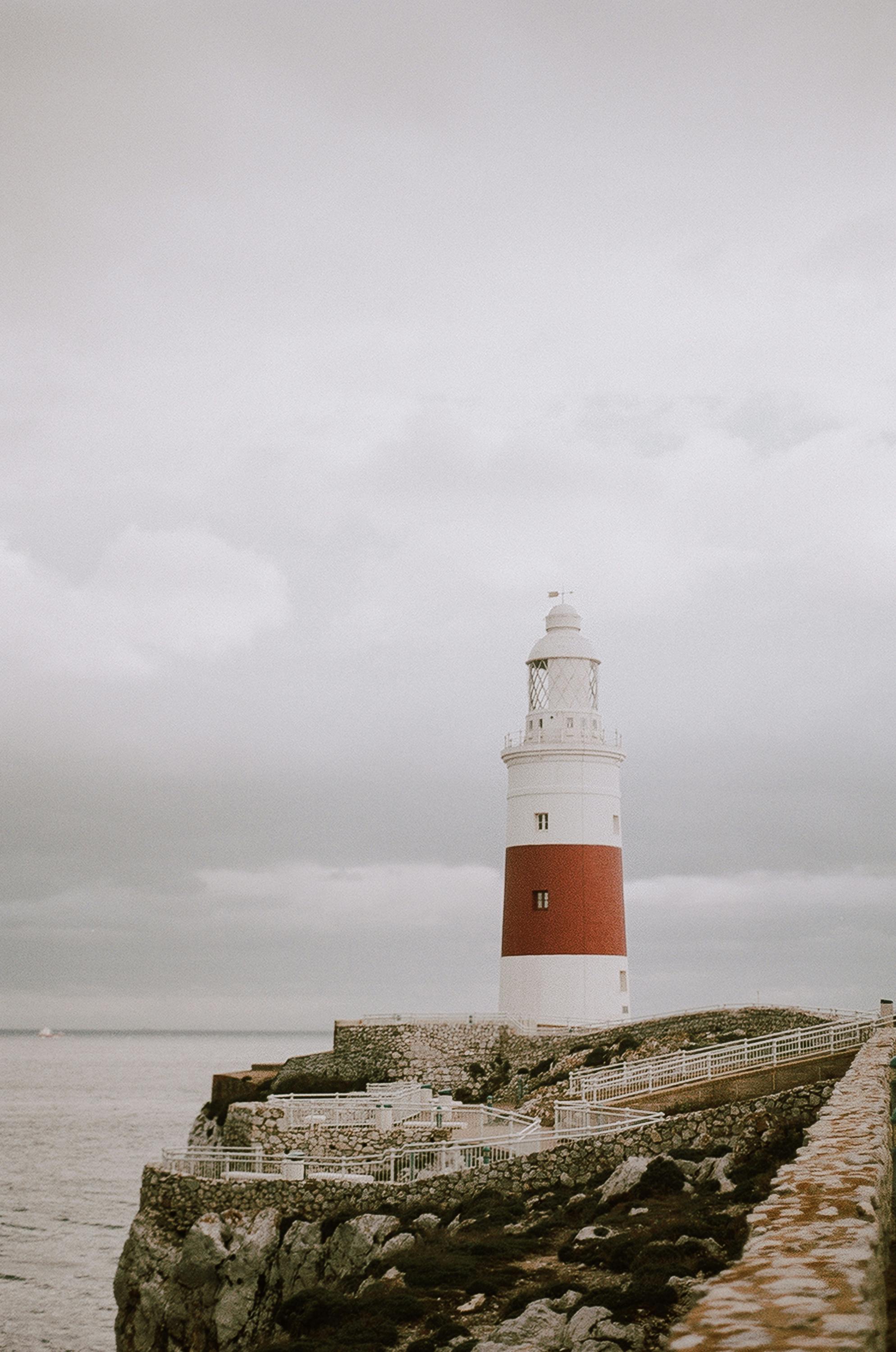 Red and White Lighthouse · Free Stock Photo