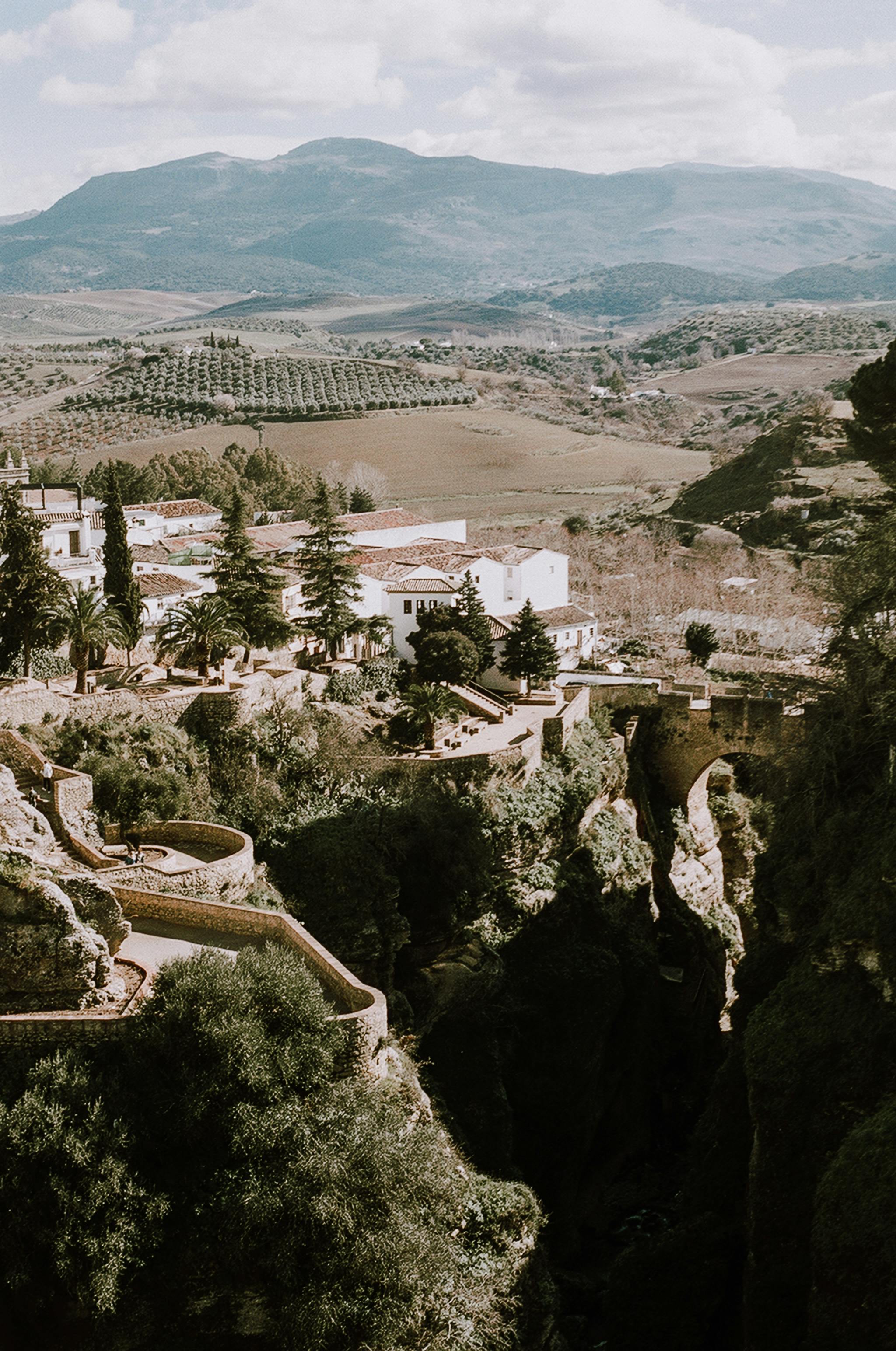 Old town with colorful buildings on hill slope · Free Stock Photo