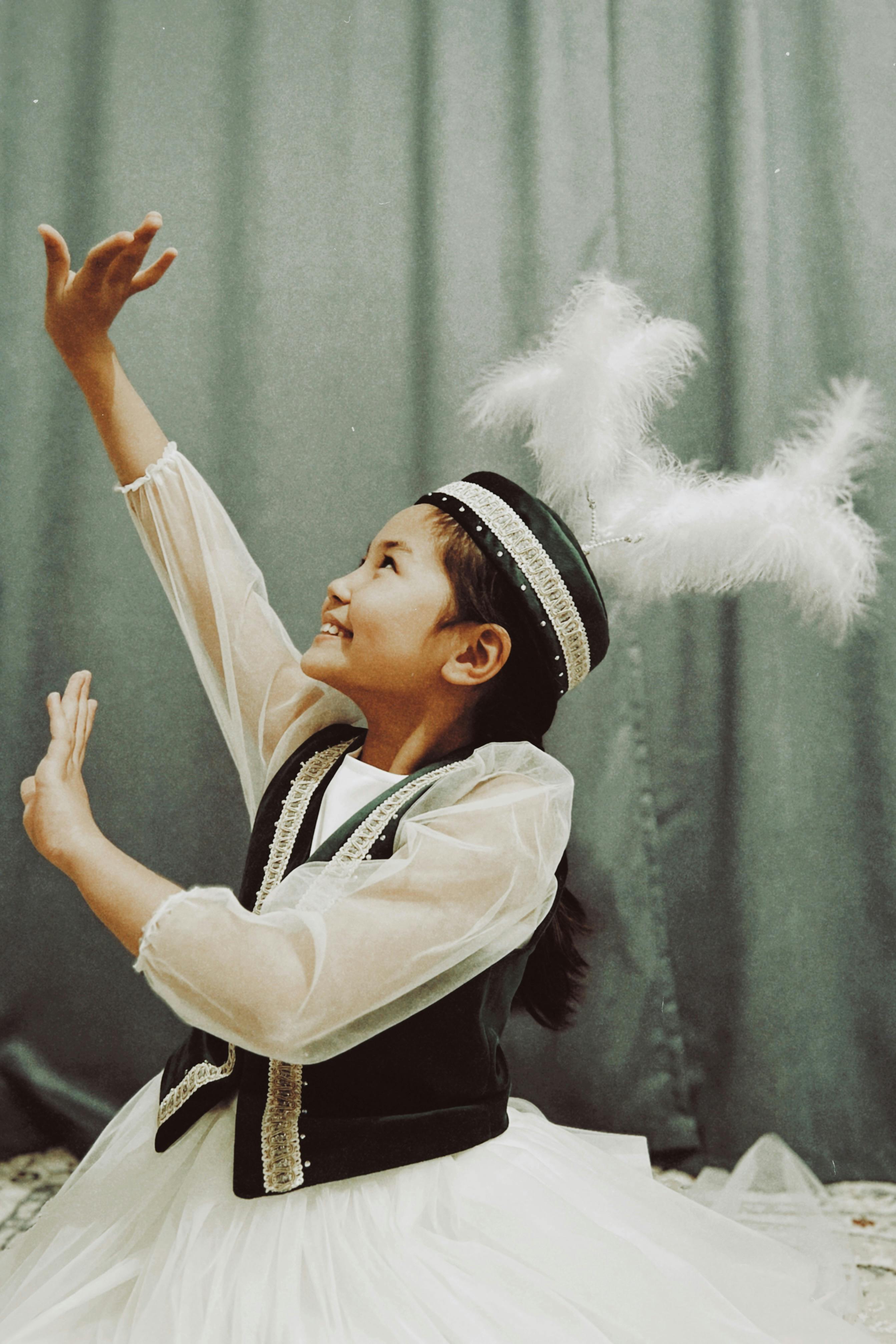 Young Girl in Traditional Kazakh Dance Costume · Free Stock Photo