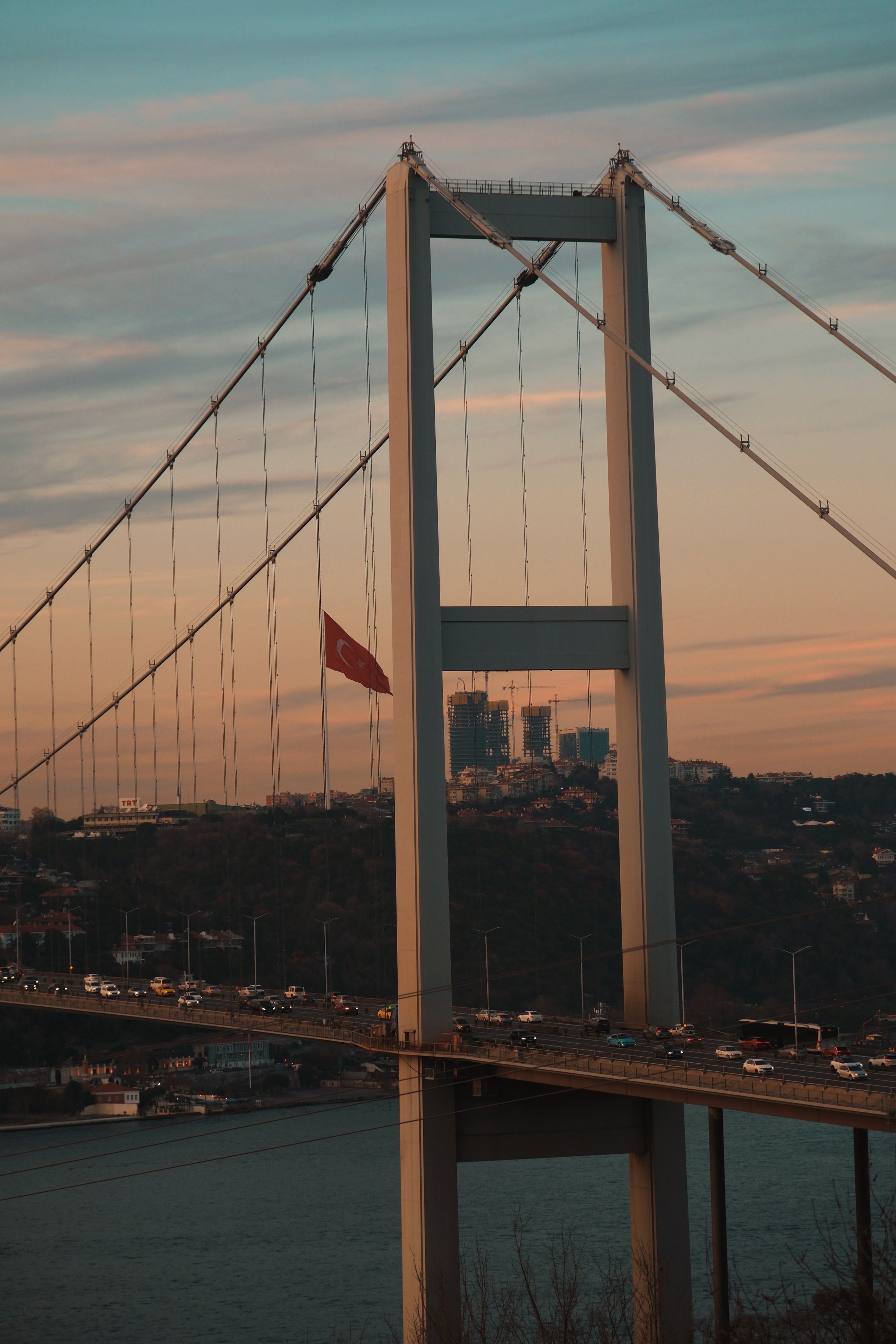 Bosphorus Bridge at Sunset with Turkish Flag · Free Stock Photo