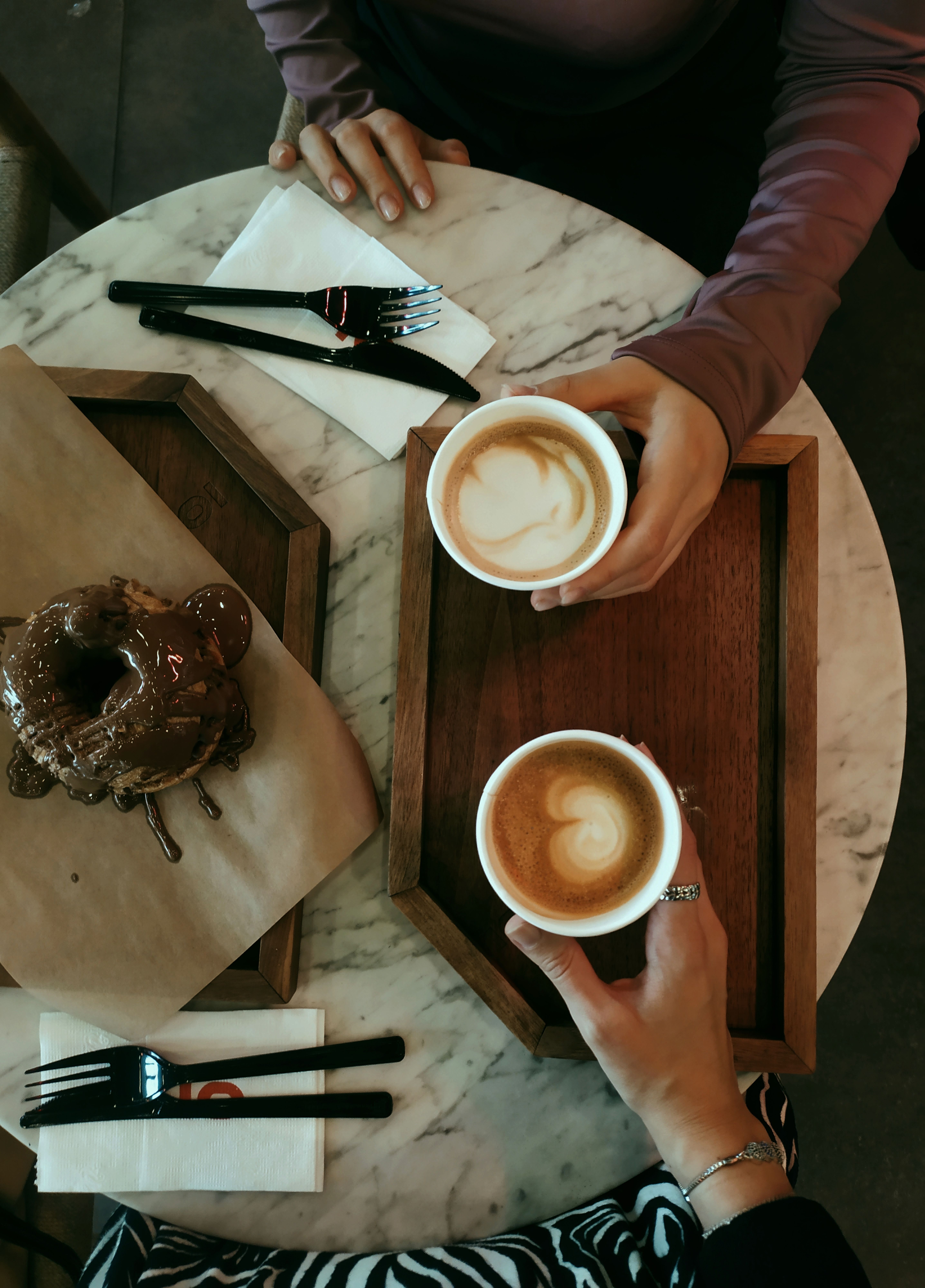 Café Table with Coffee and Donuts · Free Stock Photo