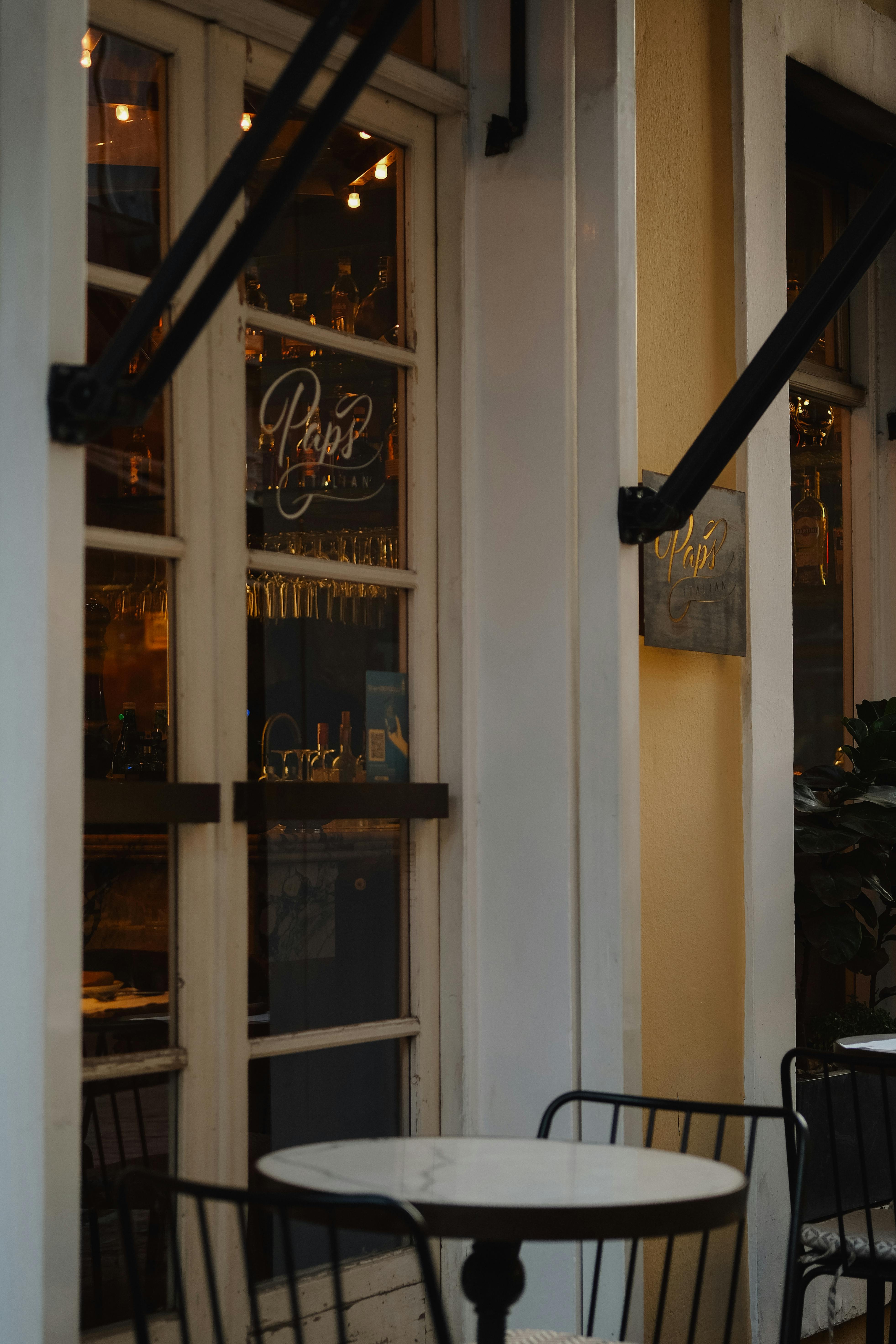 Charming Outdoor Cafe Seating with Rustic Decor · Free Stock Photo